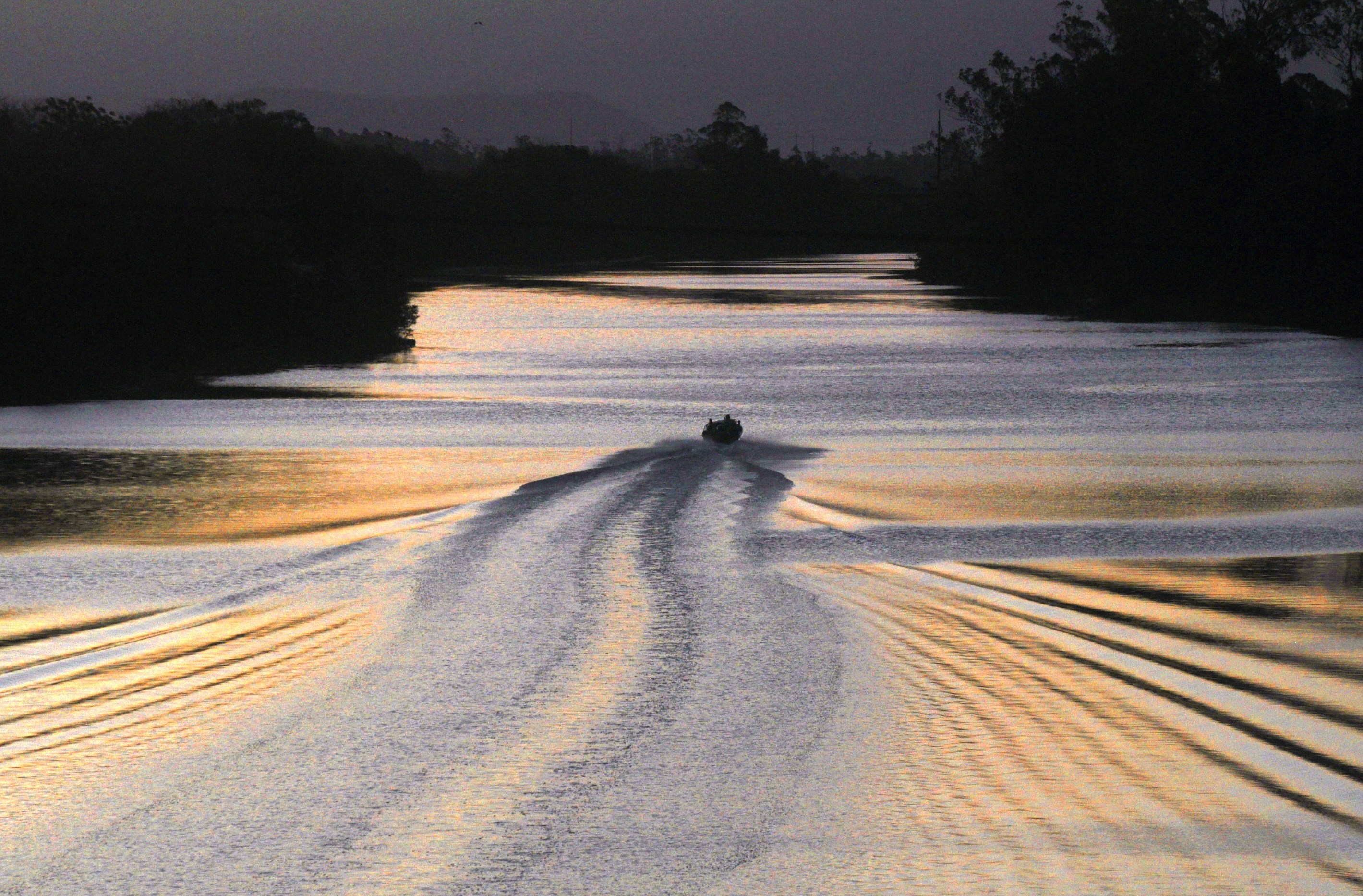 Golden Ripples on a Twilight River
