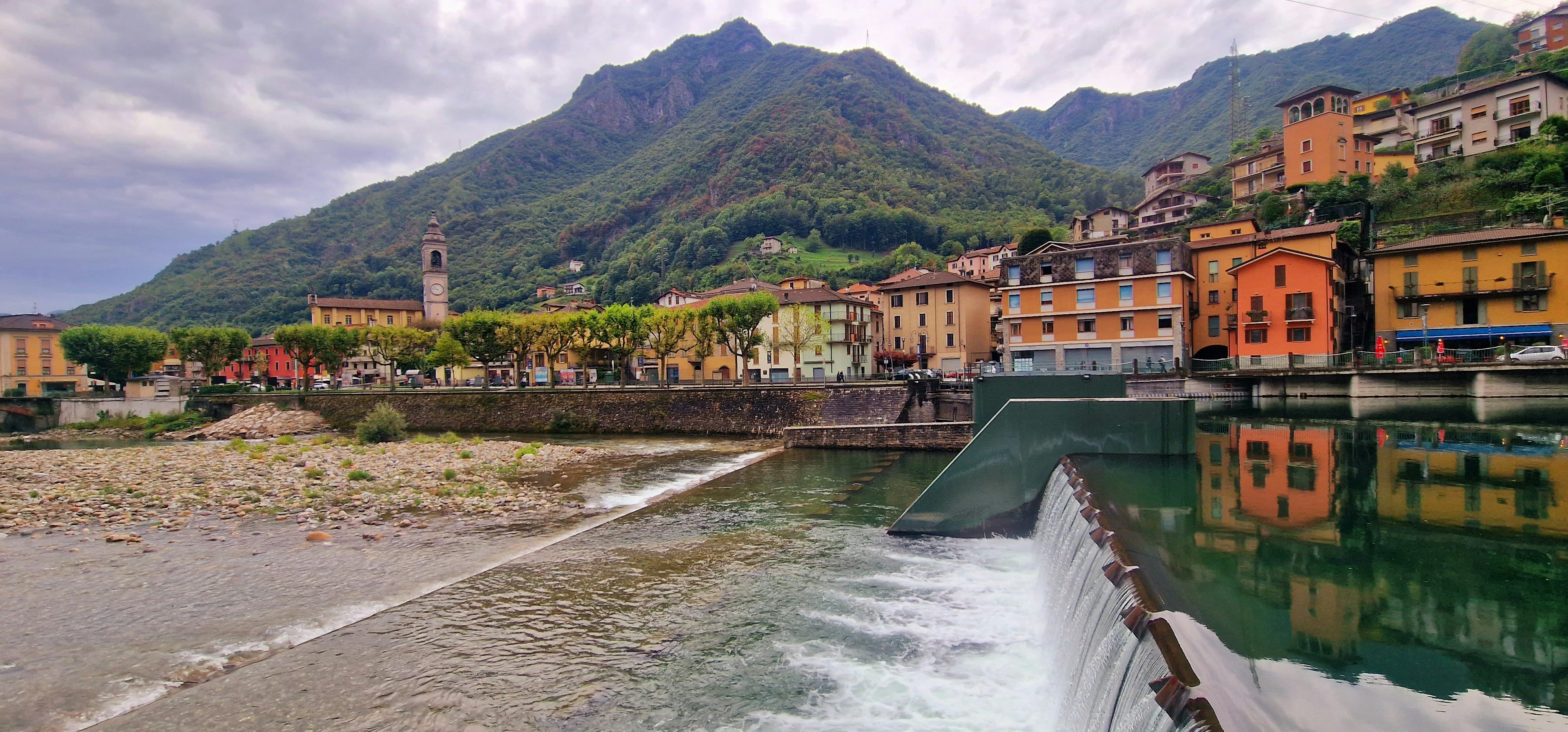 Riverside Harmony Beneath Majestic Peaks