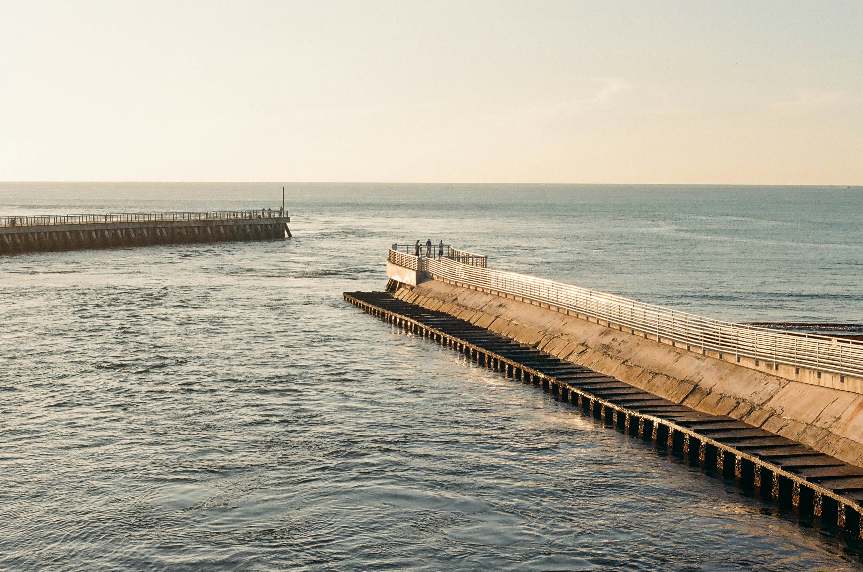 A long dock over water photo – Free Usa Image on Unsplash