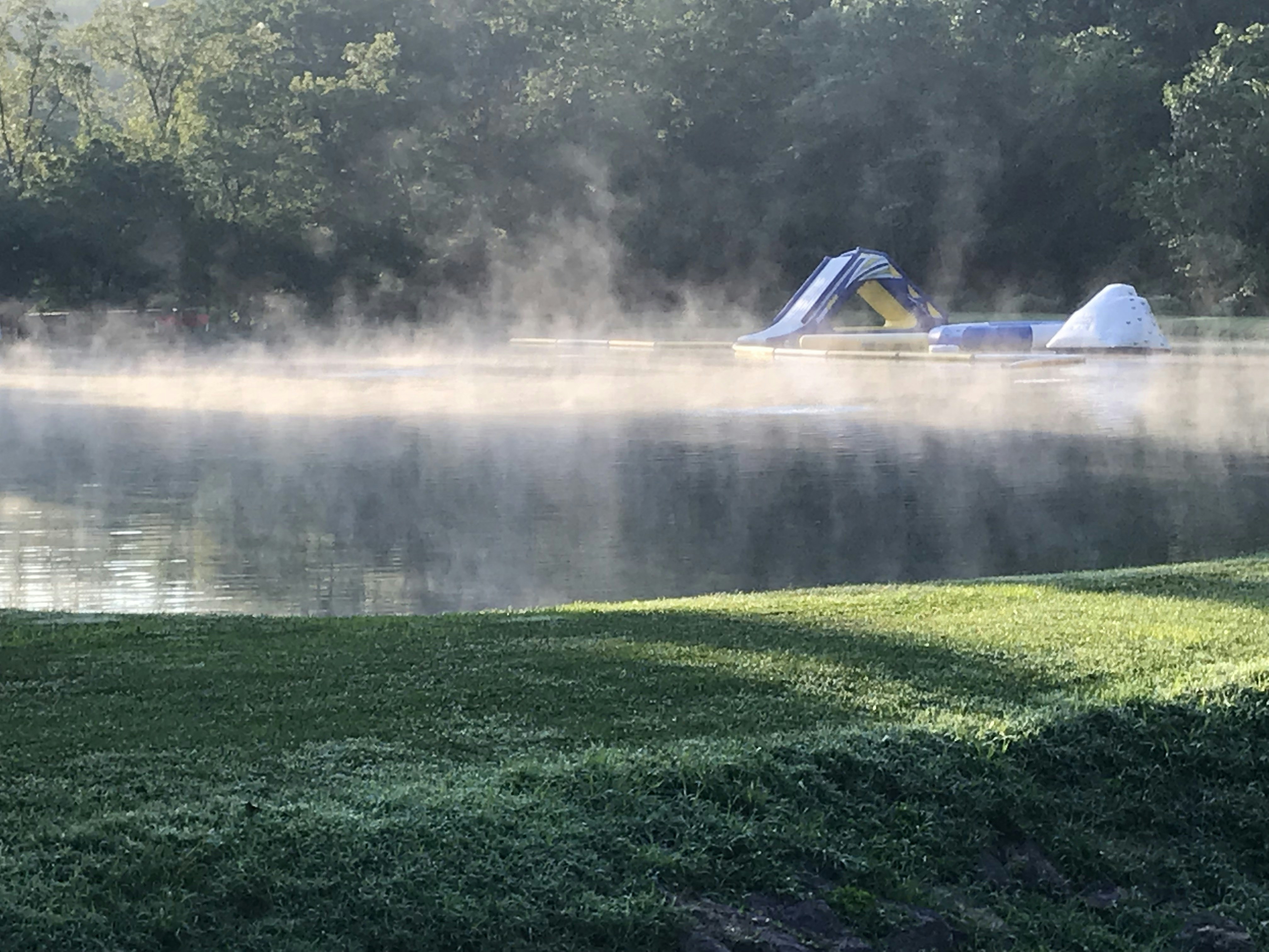Lakeside Dawn: Tent Refuge Wreathed in Morning Mist