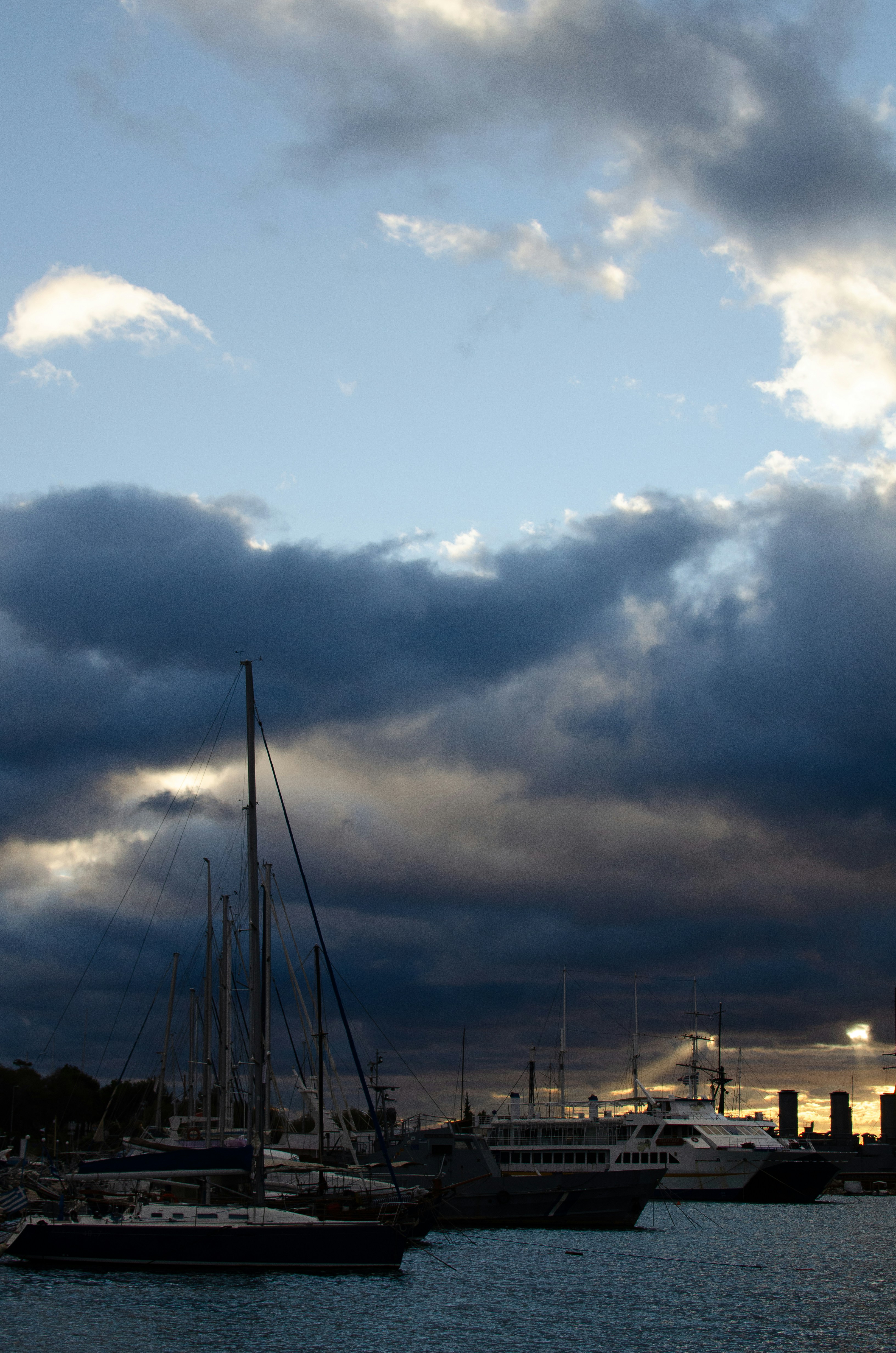 a group of boats in a harbor