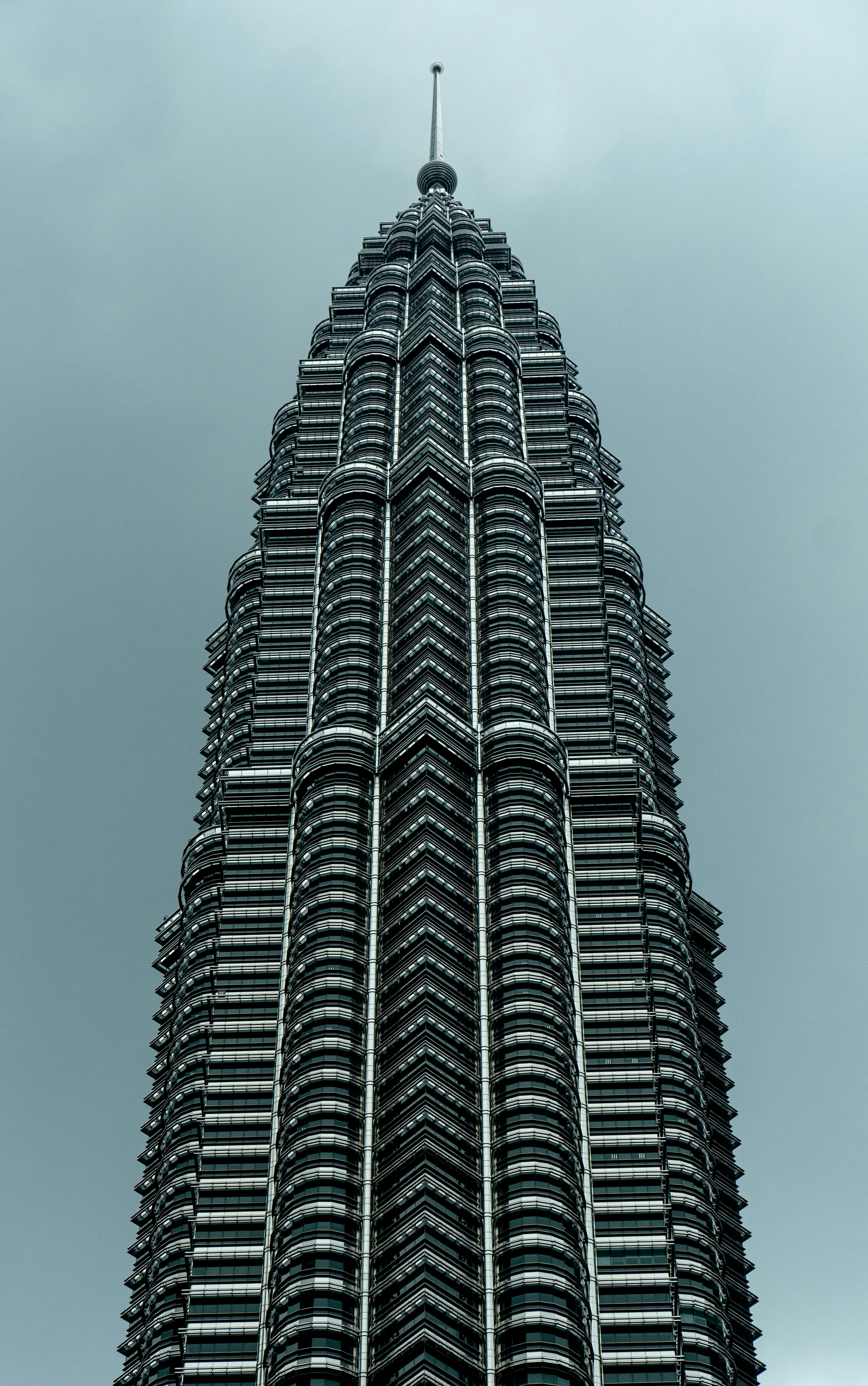 Apex of Steel: The Geometric Ascent of Kuala Lumpur's Petronas Towers