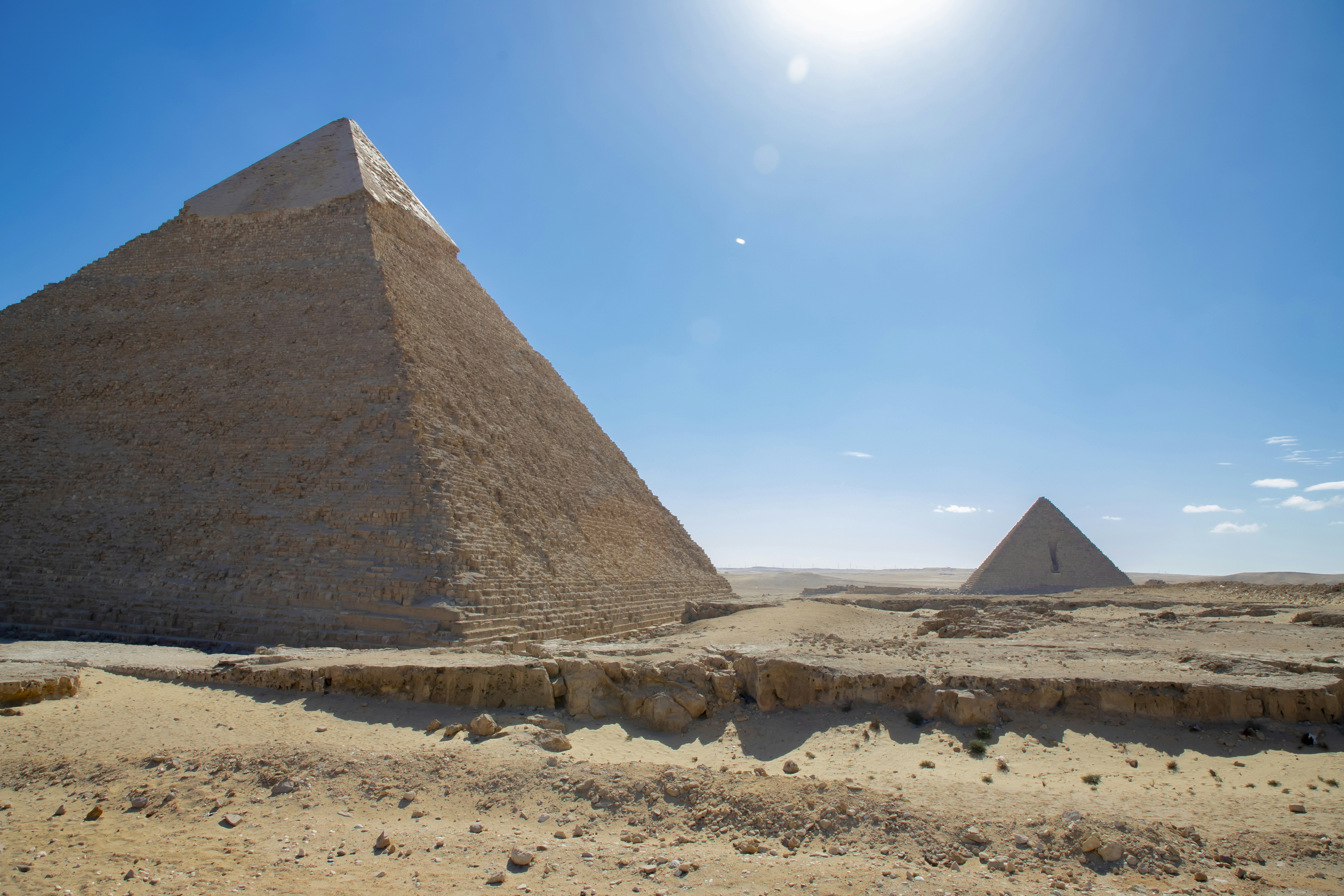 A group of pyramids in a desert photo – Free Pyramid of giza Image on ...