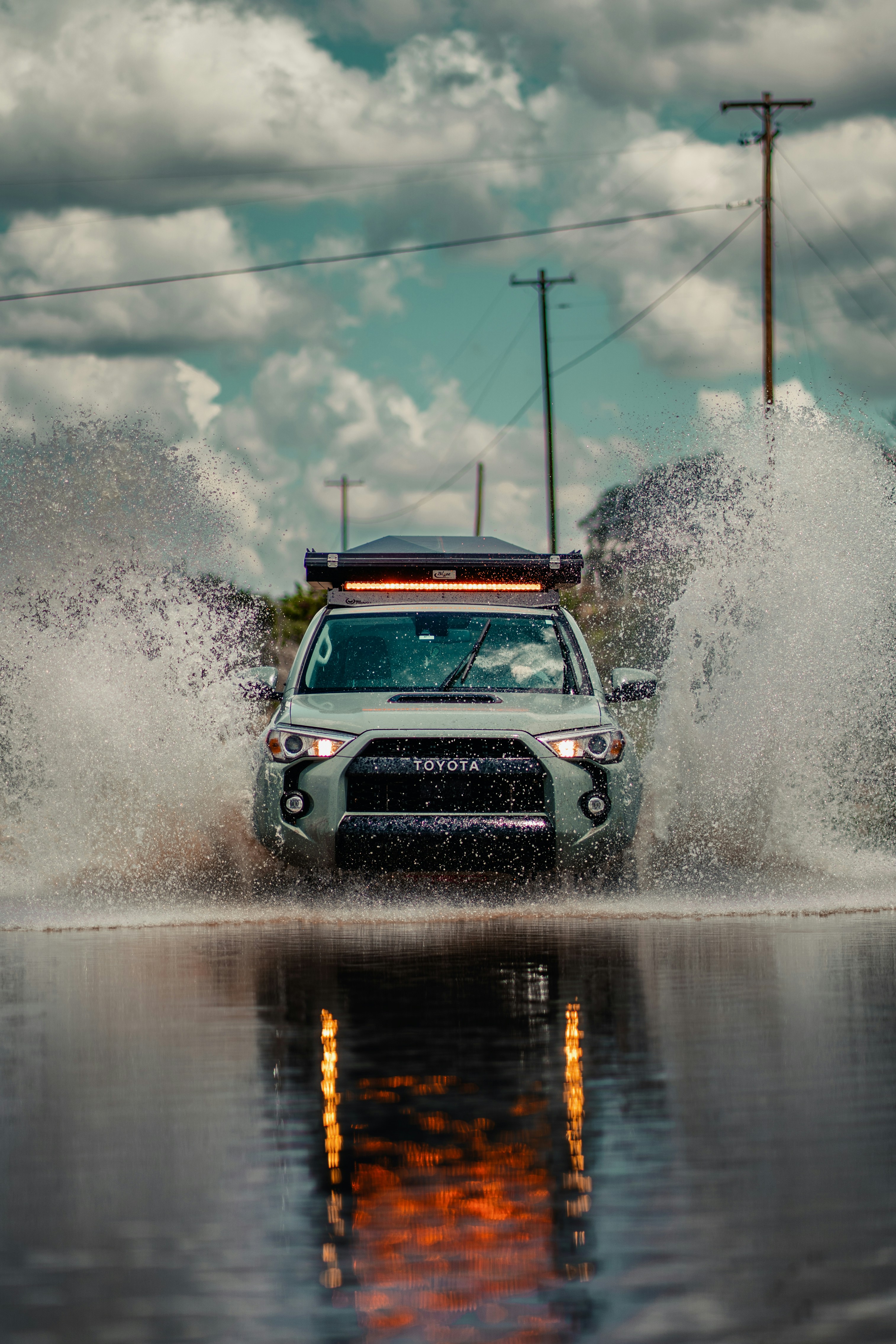 A car driving through water photo – Free Grey Image on Unsplash