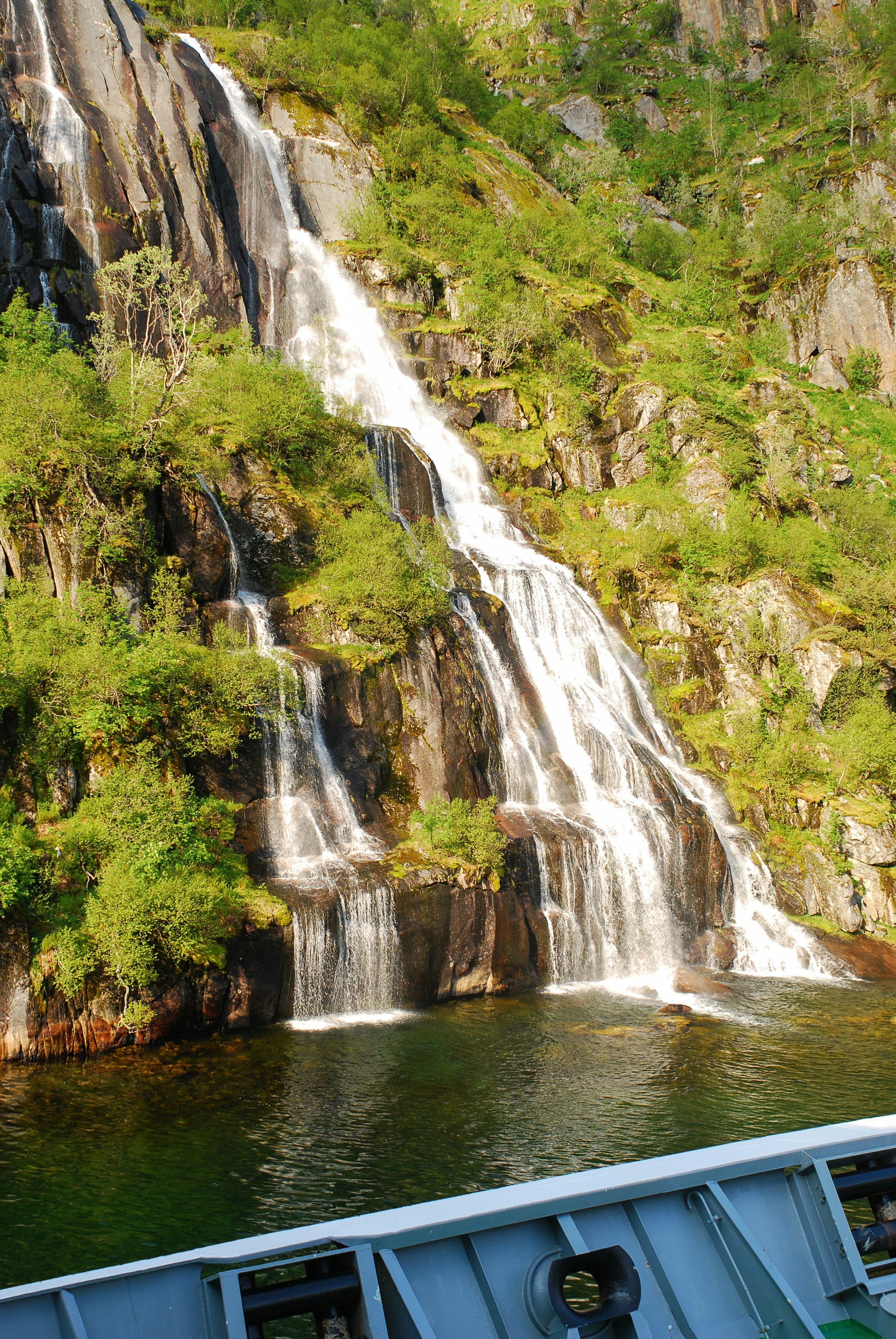 A waterfall over a cliff photo – Free Water Image on Unsplash