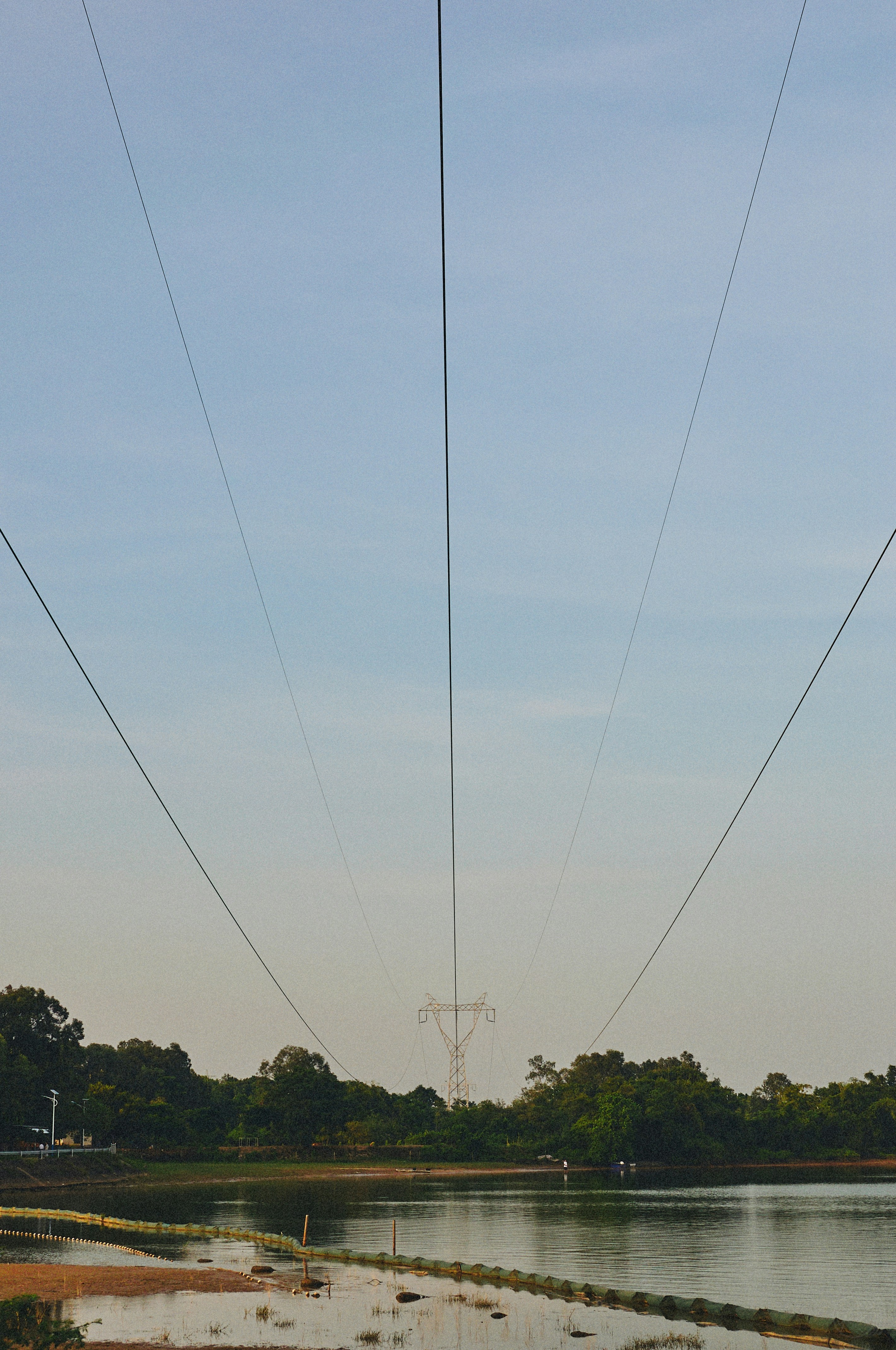 A power line over a river photo – Free Image on Unsplash