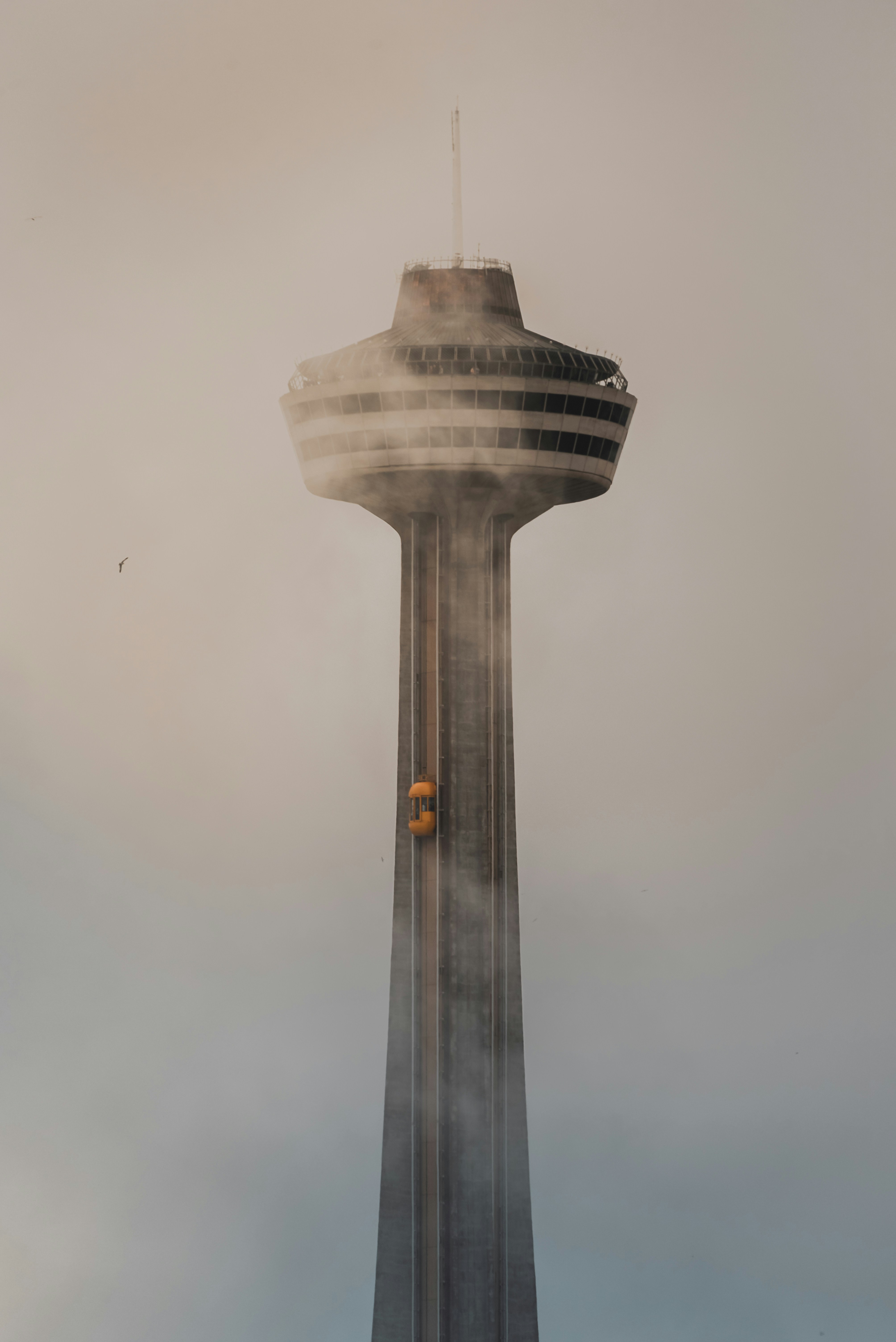 A tall tower with a circular top photo – Free Niagara falls Image on ...