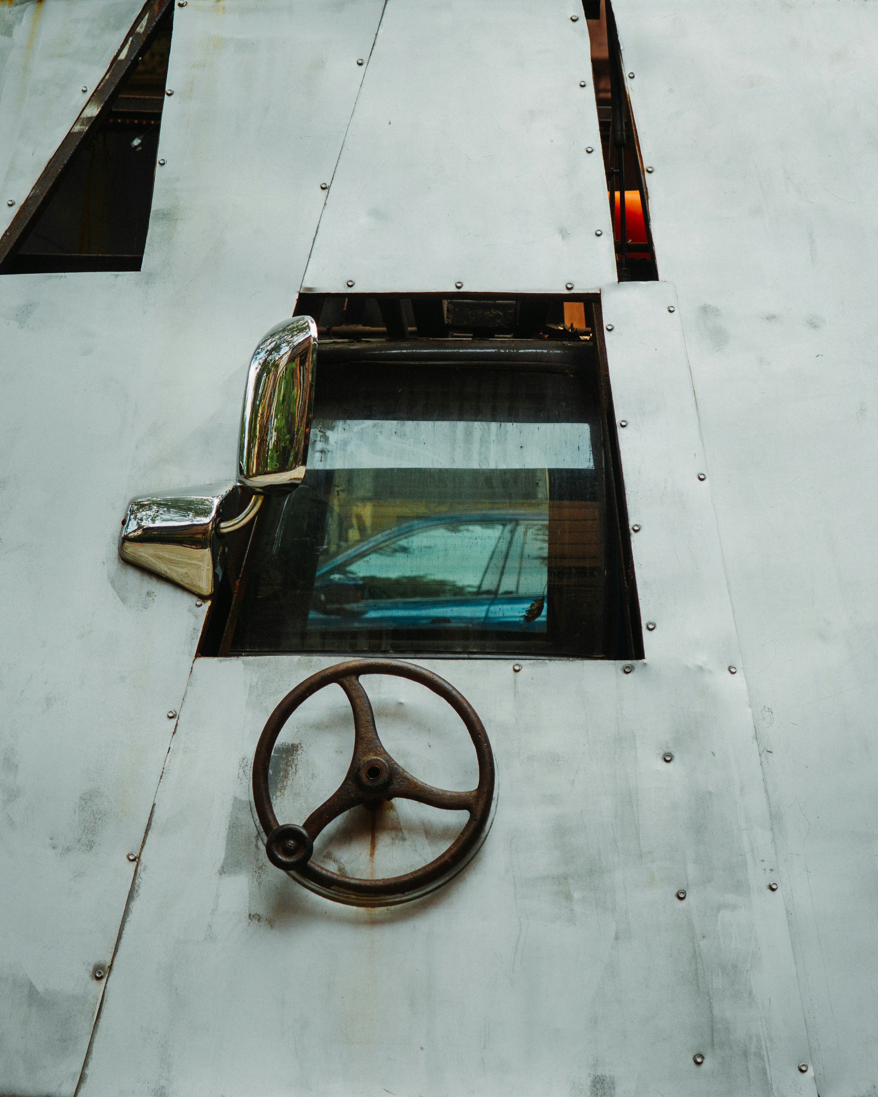 The Industrial Reflection: A Study in Metal and Glass