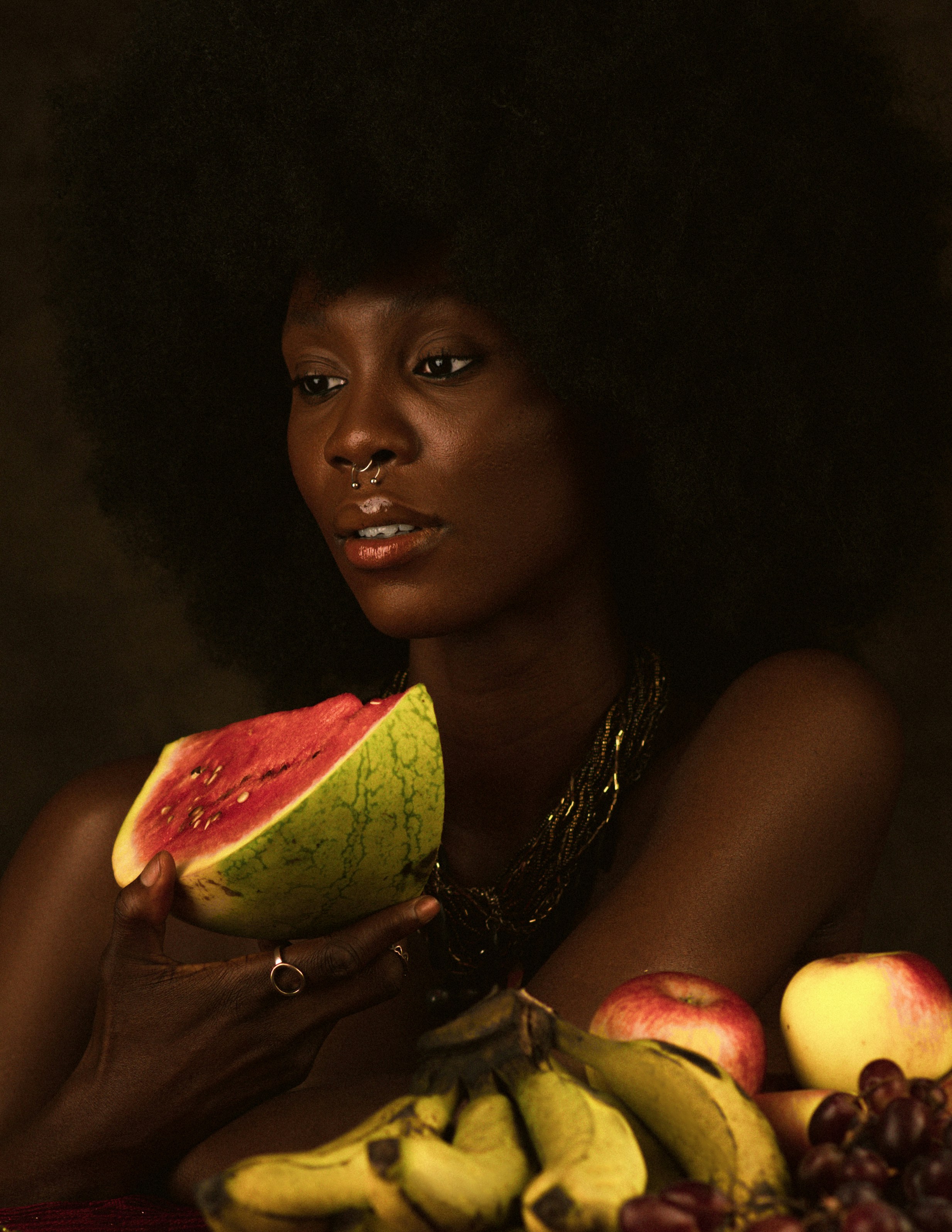 Nocturne with Watermelon: An Afro Portrait Amid a Moonlit Fruit Still Life