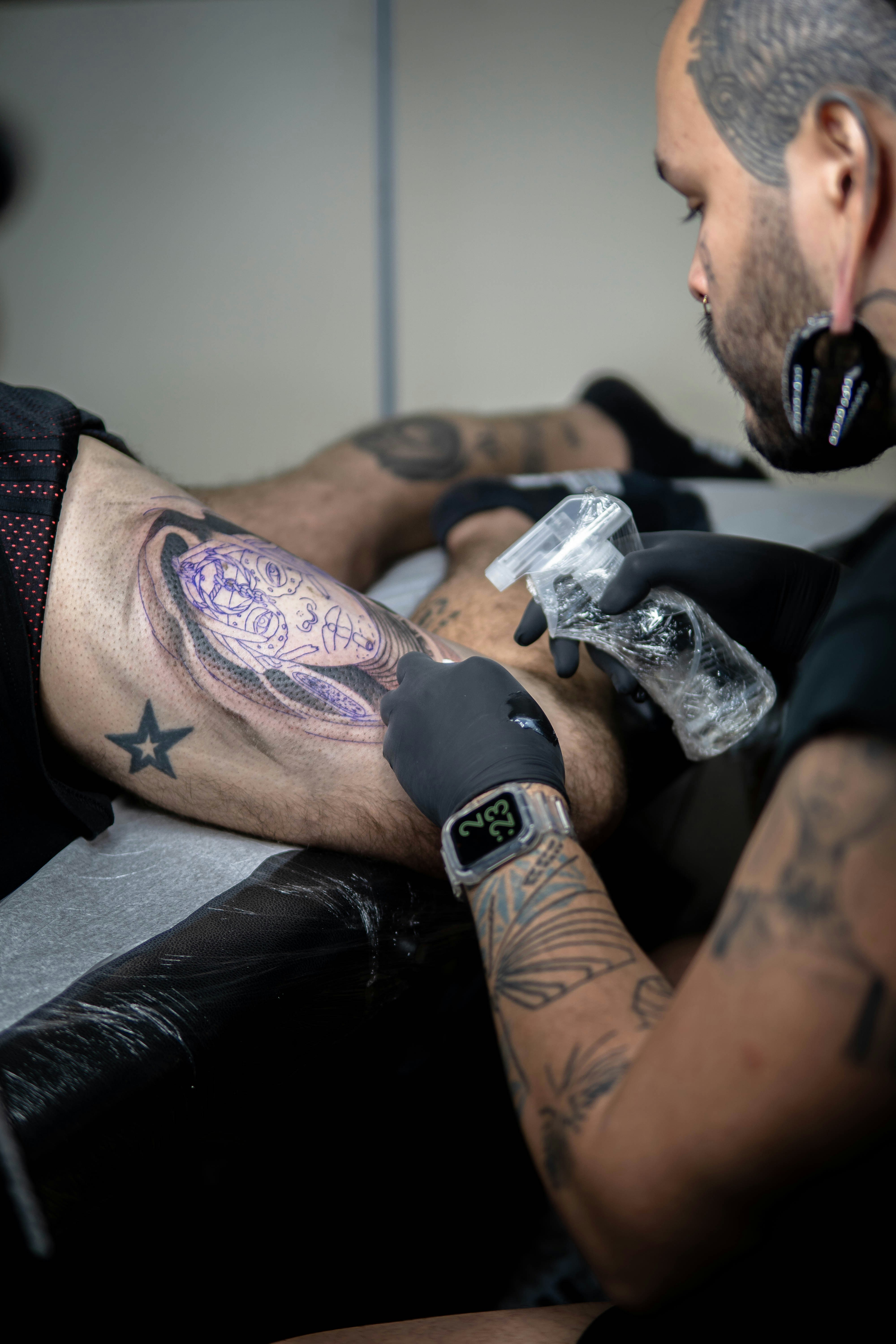 Precision in Progress: Purple Ink Emerges on a Leg Canvas