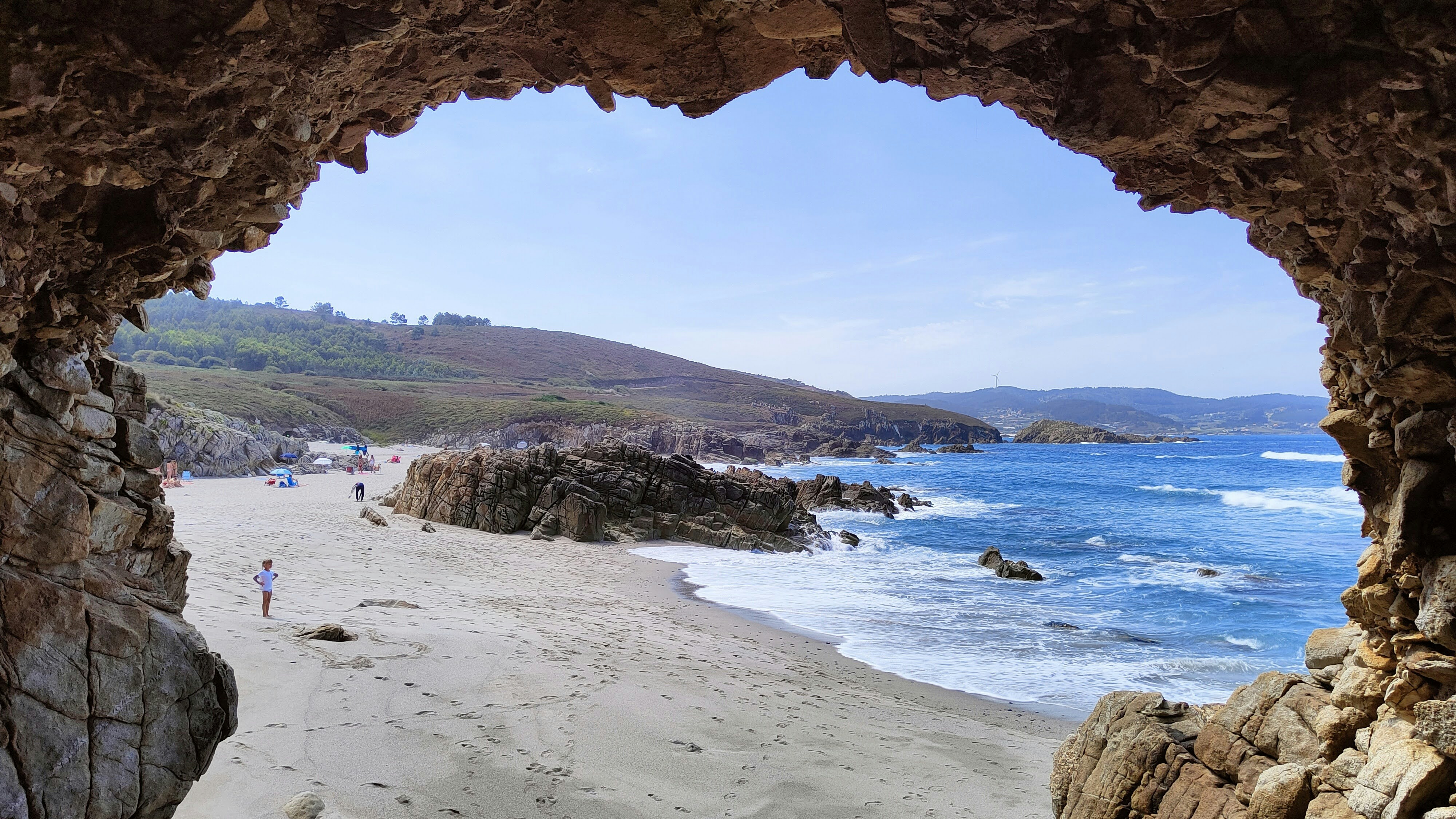 A beach with a large rock arch photo – Free Ripibelo beach Image on ...