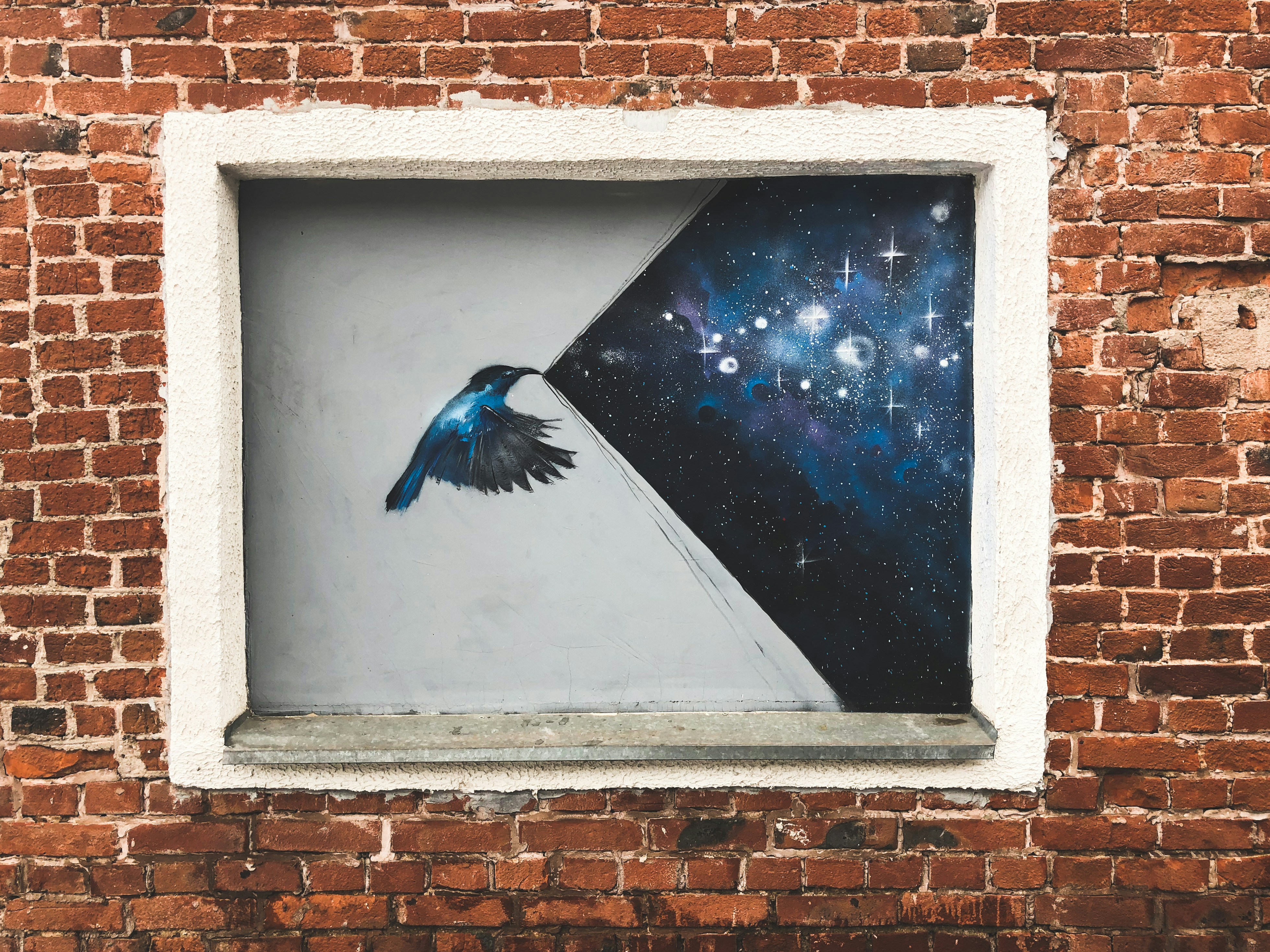 Blue Wanderer in a Brick-Frame Galaxy