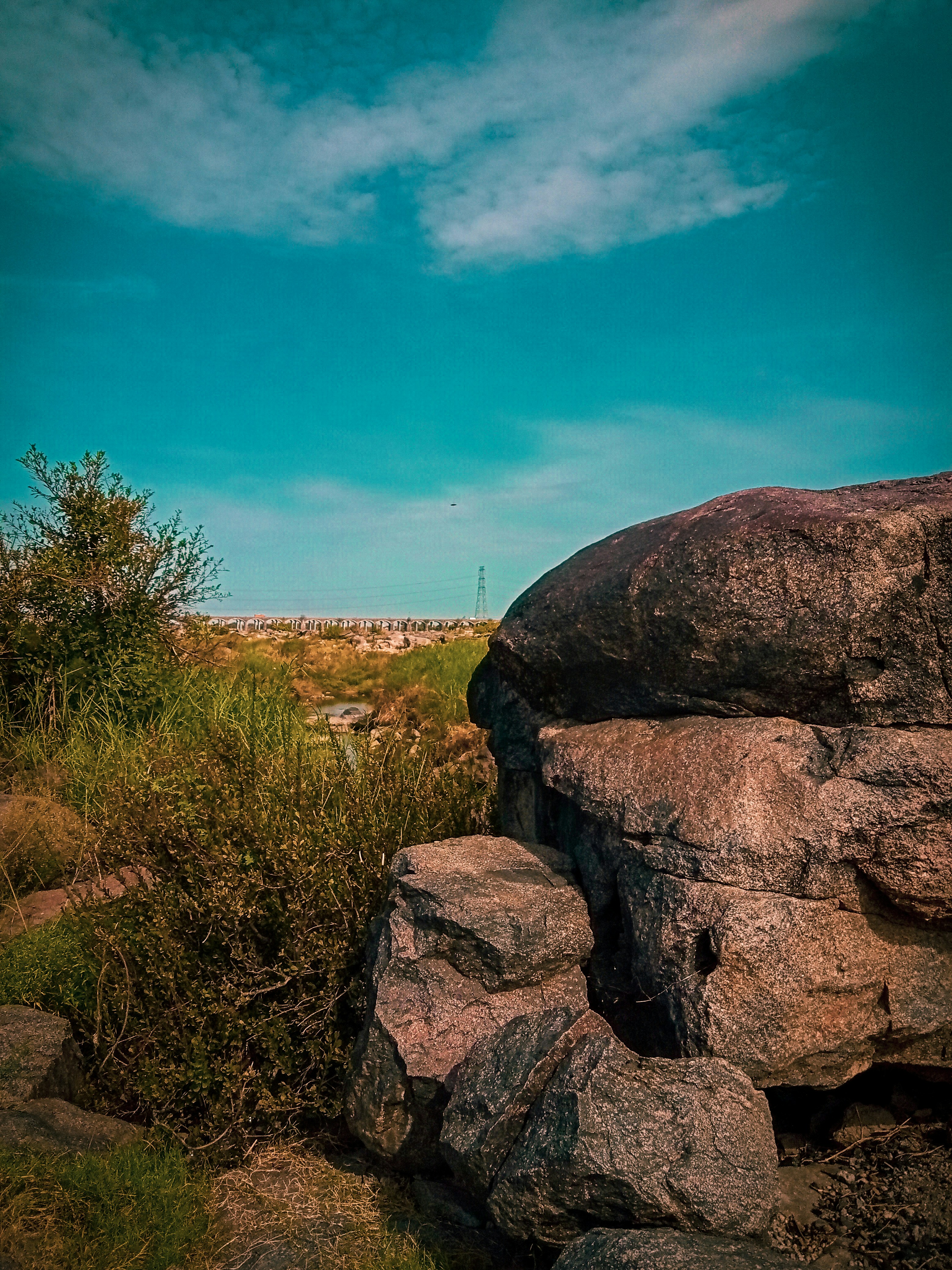 Stone Sentinel by a Turquoise Sky