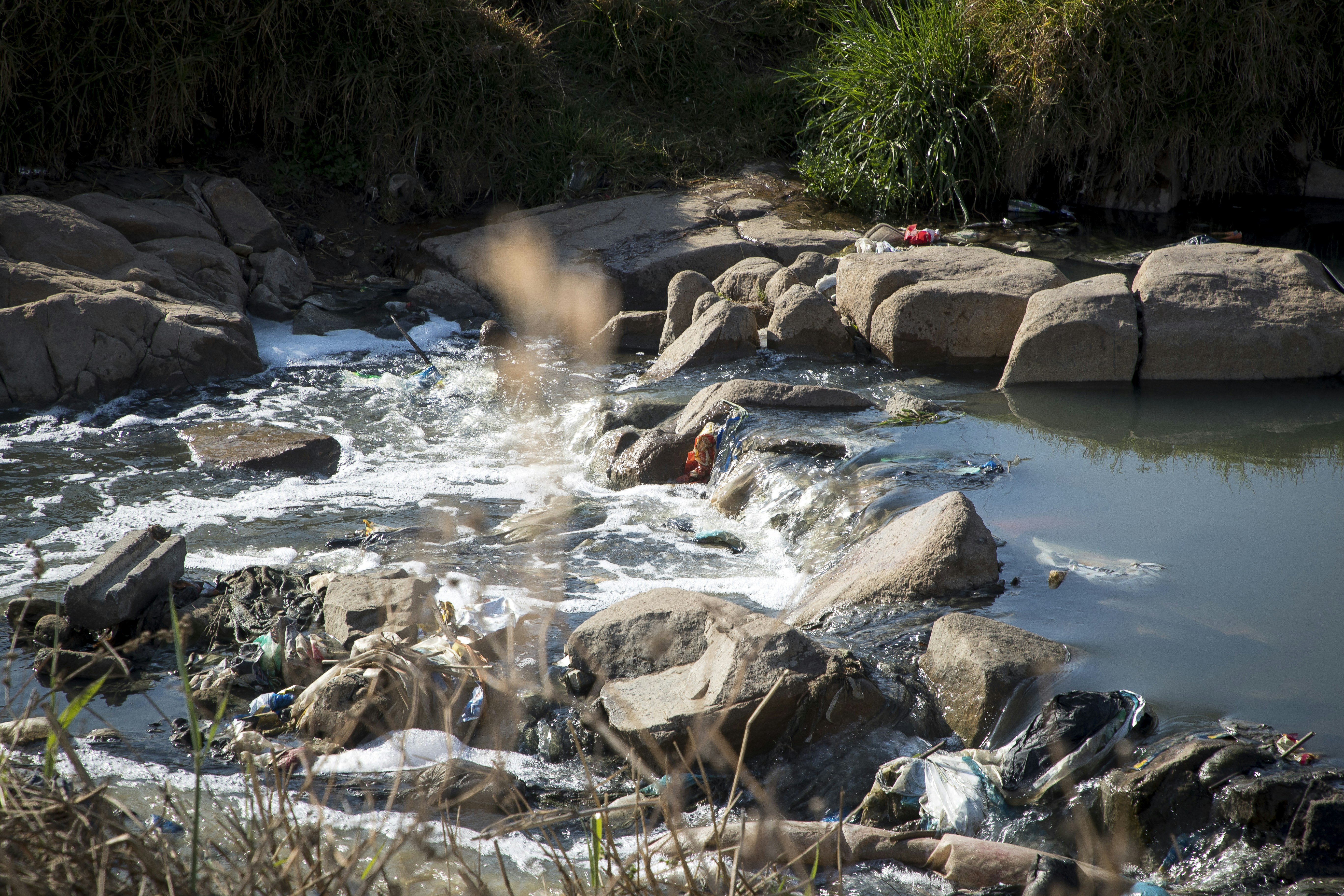 A river with rocks and a waterfall photo – Free Johannesburg Image on ...
