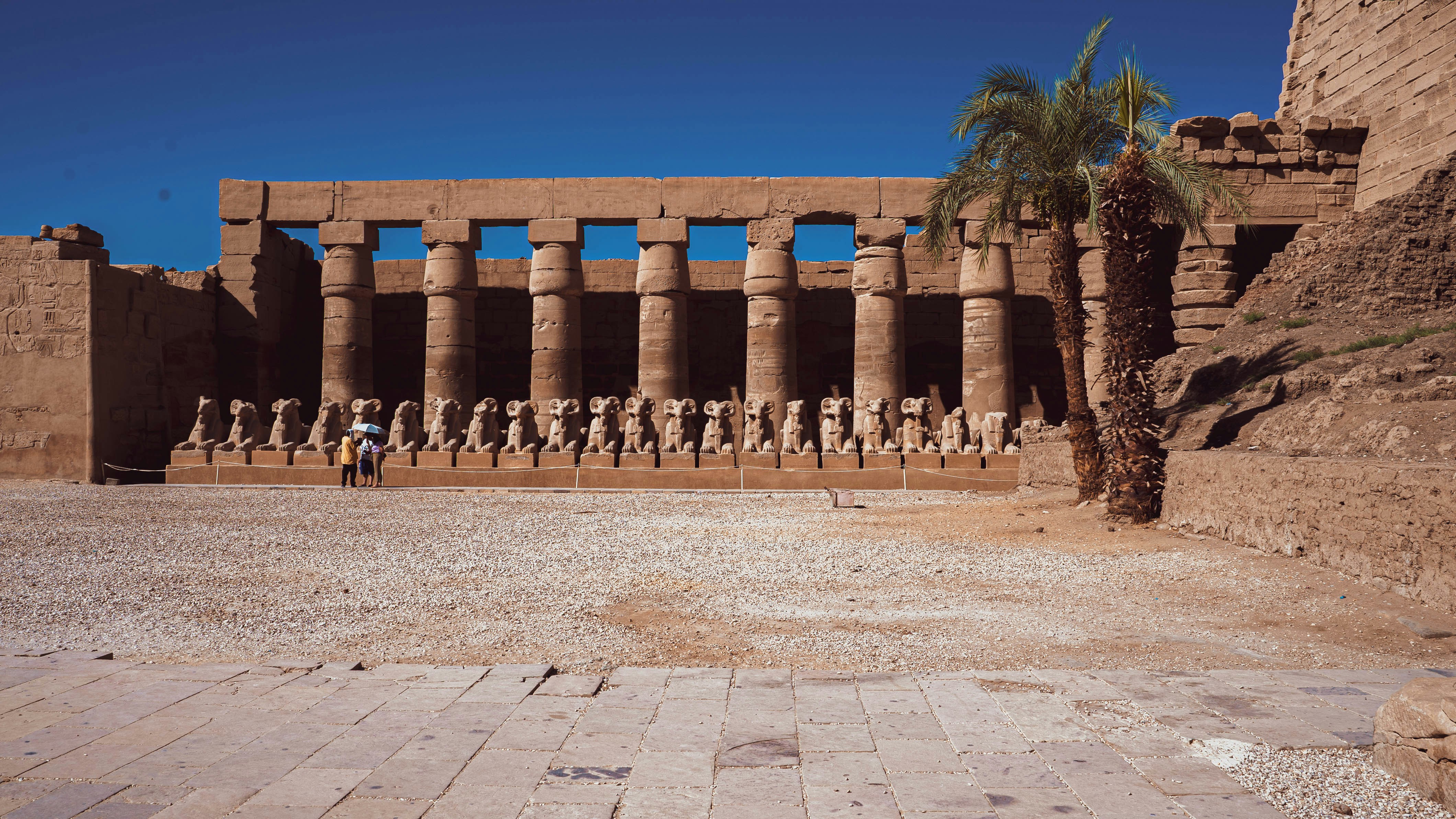 Time-Worn Colonnade under a Cerulean Desert Sky