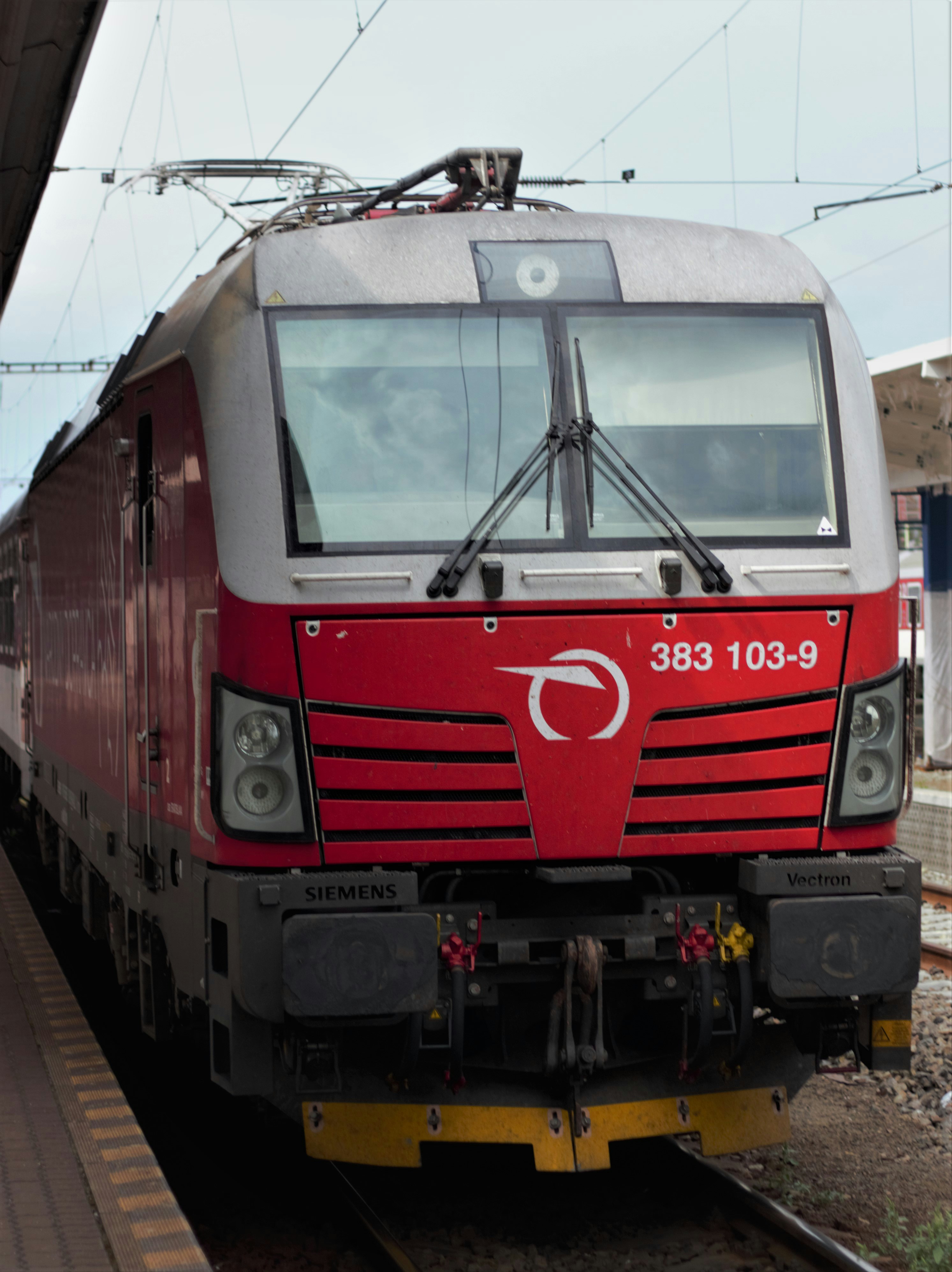 Red Locomotive Front: A Bold Steel Face at Platform Edge