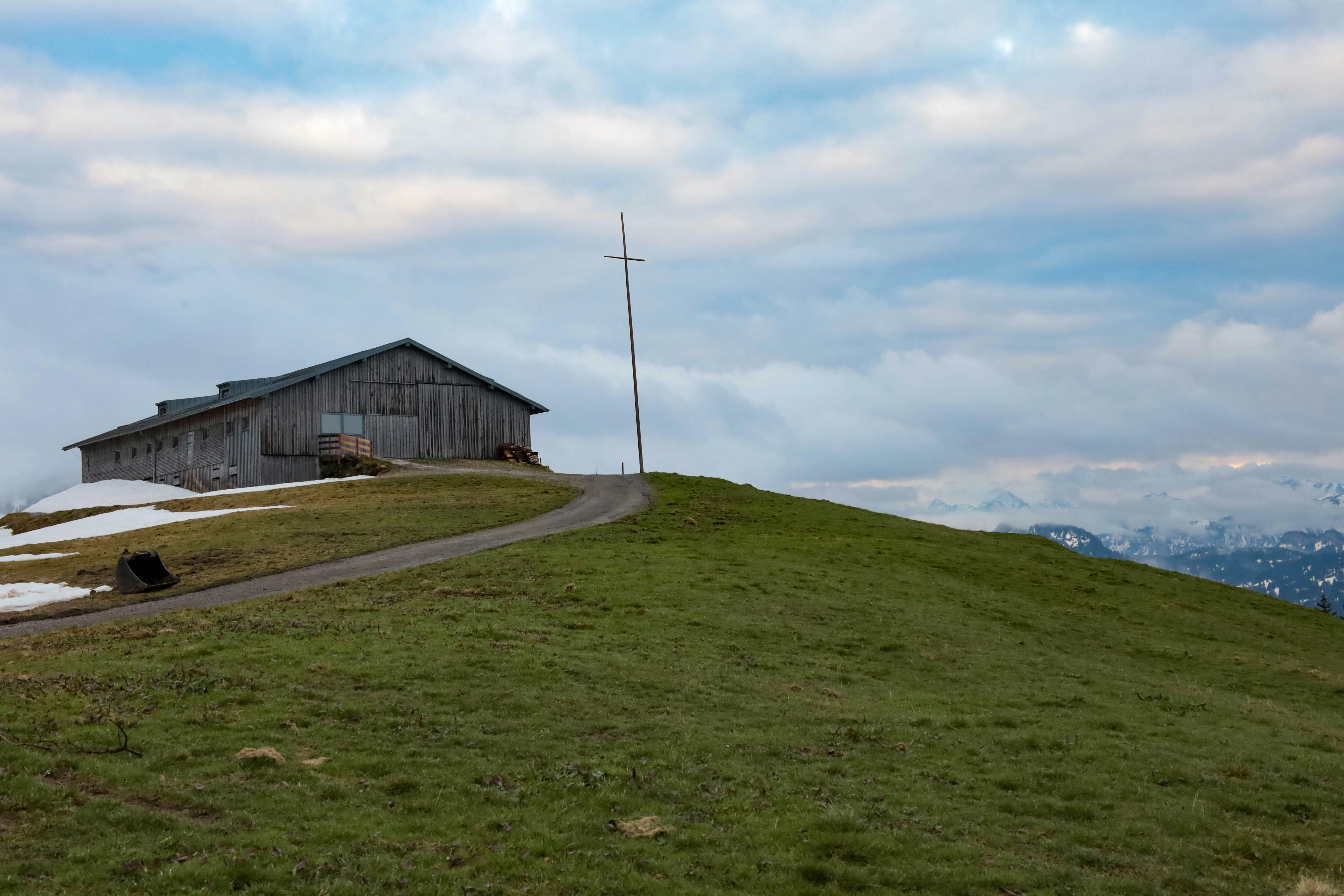 A building on a hill photo – Free Nature Image on Unsplash