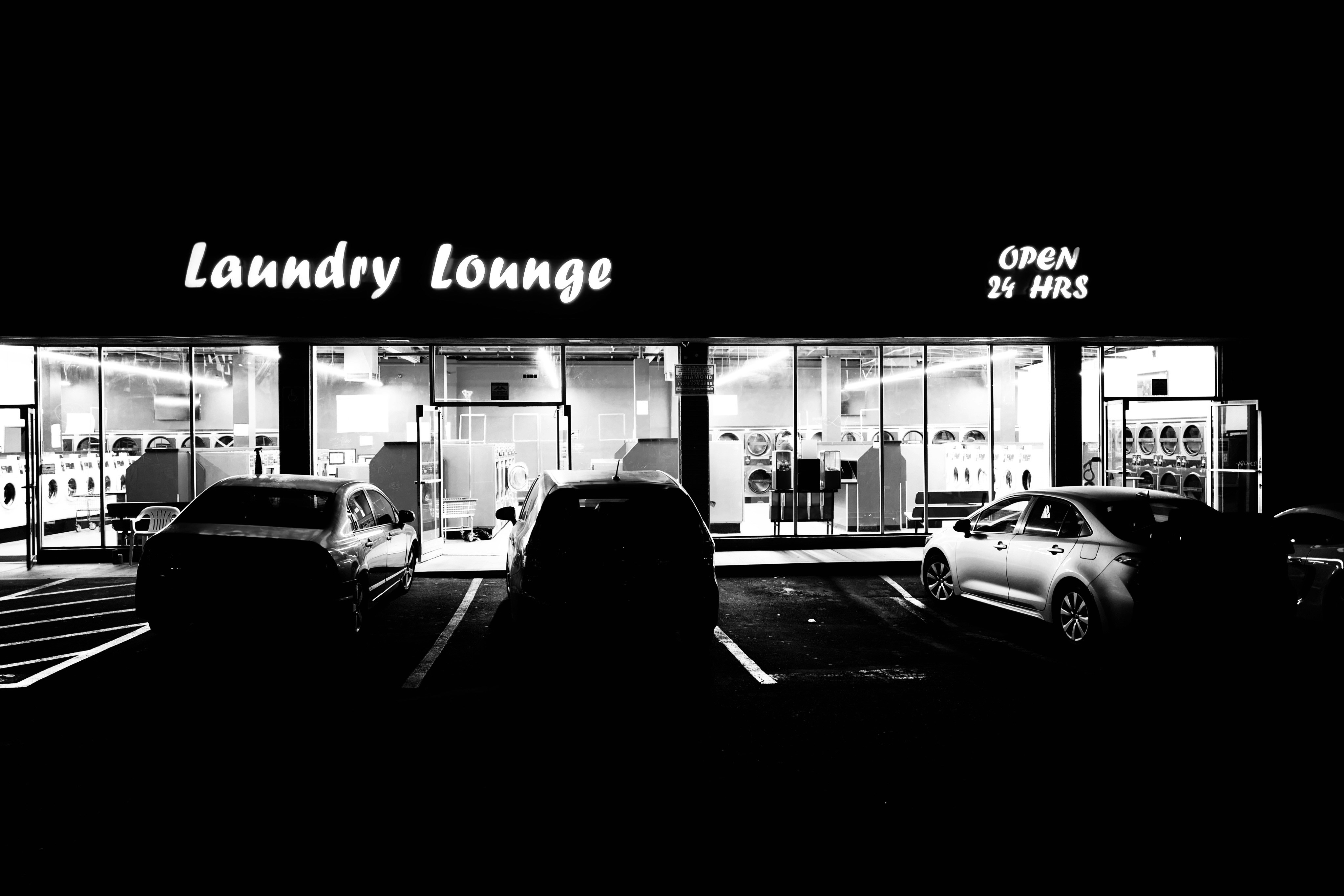 Laundromat Spotlight: Empty Parking Lot at Midnight