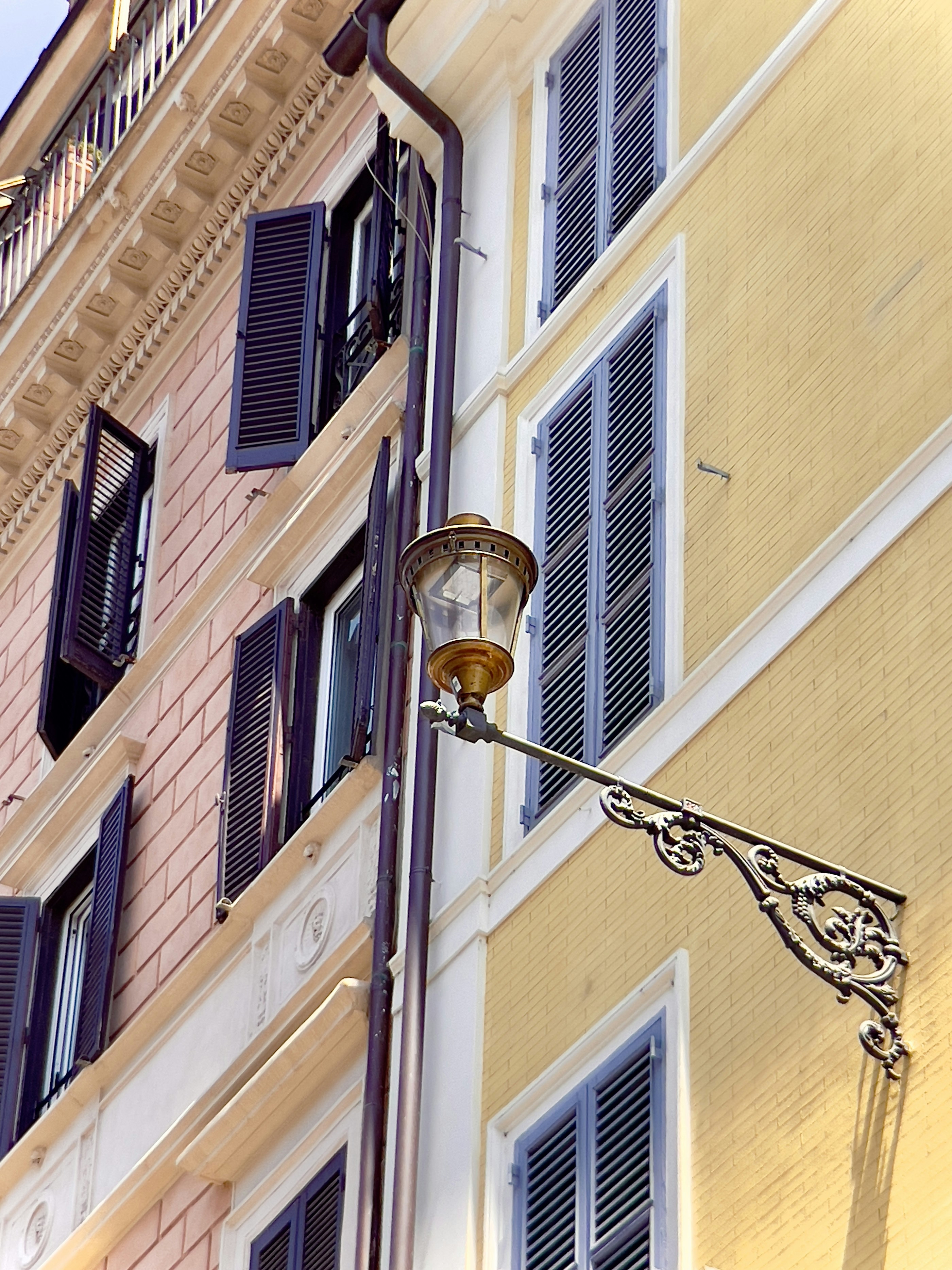 Gaslit Lantern Adorns a European Facade