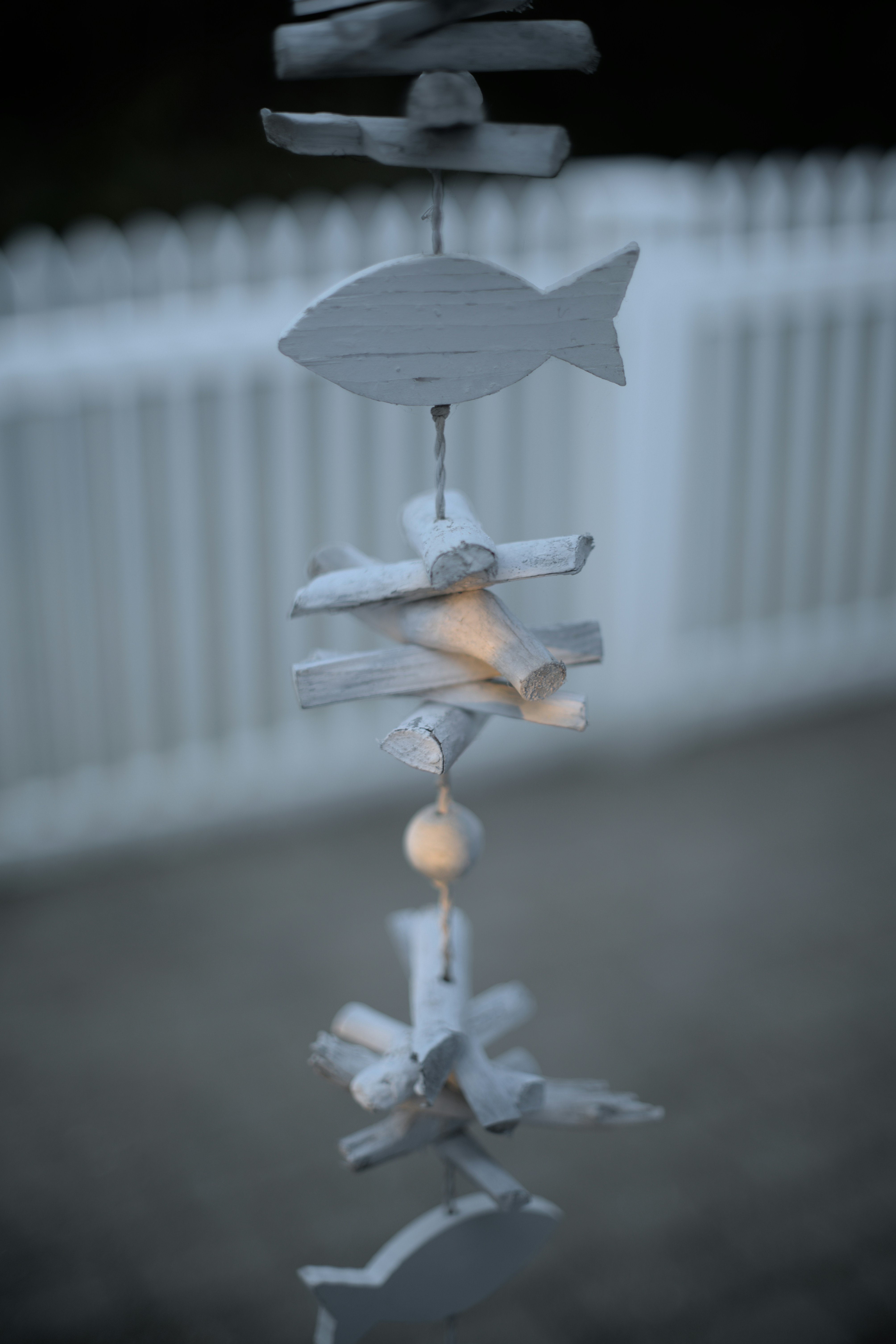 Driftwood Fish Garland in Soft Blue Hour Blur