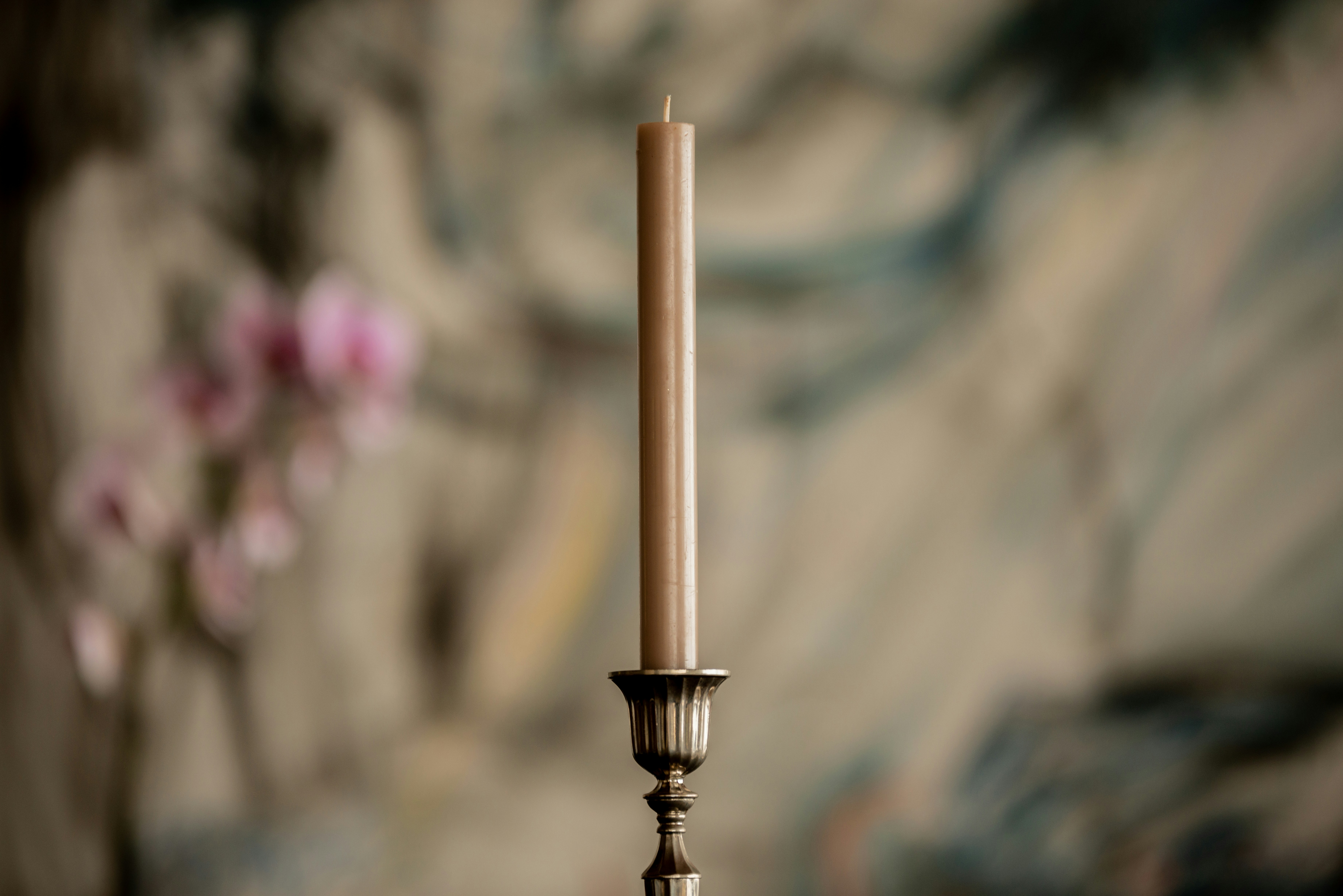 Whispers of Light: A Candle's Solitude