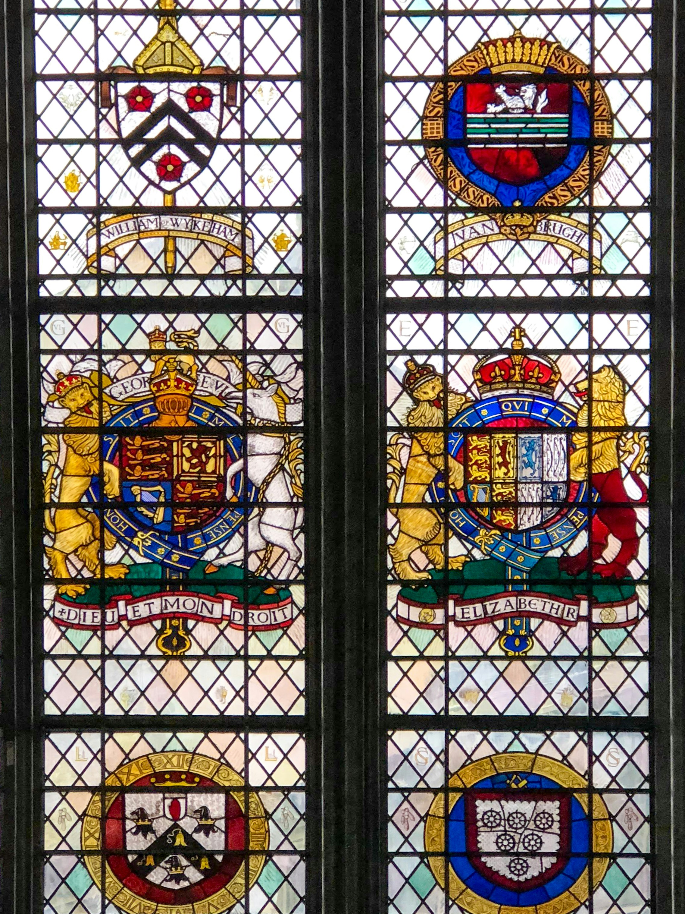 One of the stained glass windows of Westminster Abbey, showing the royal coat of arms.