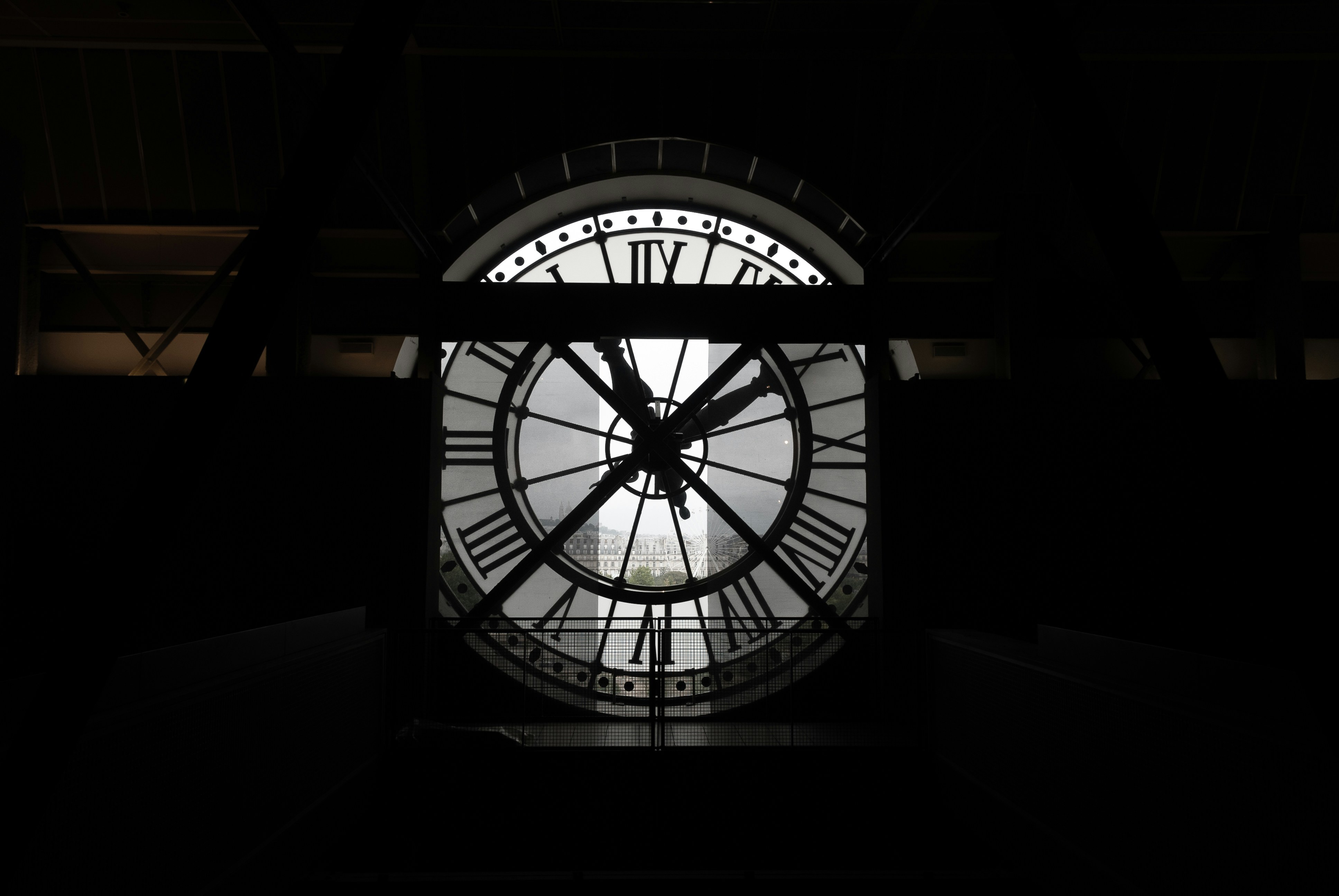 A clock in a dark room photo – Free Musée d'orsay Image on Unsplash