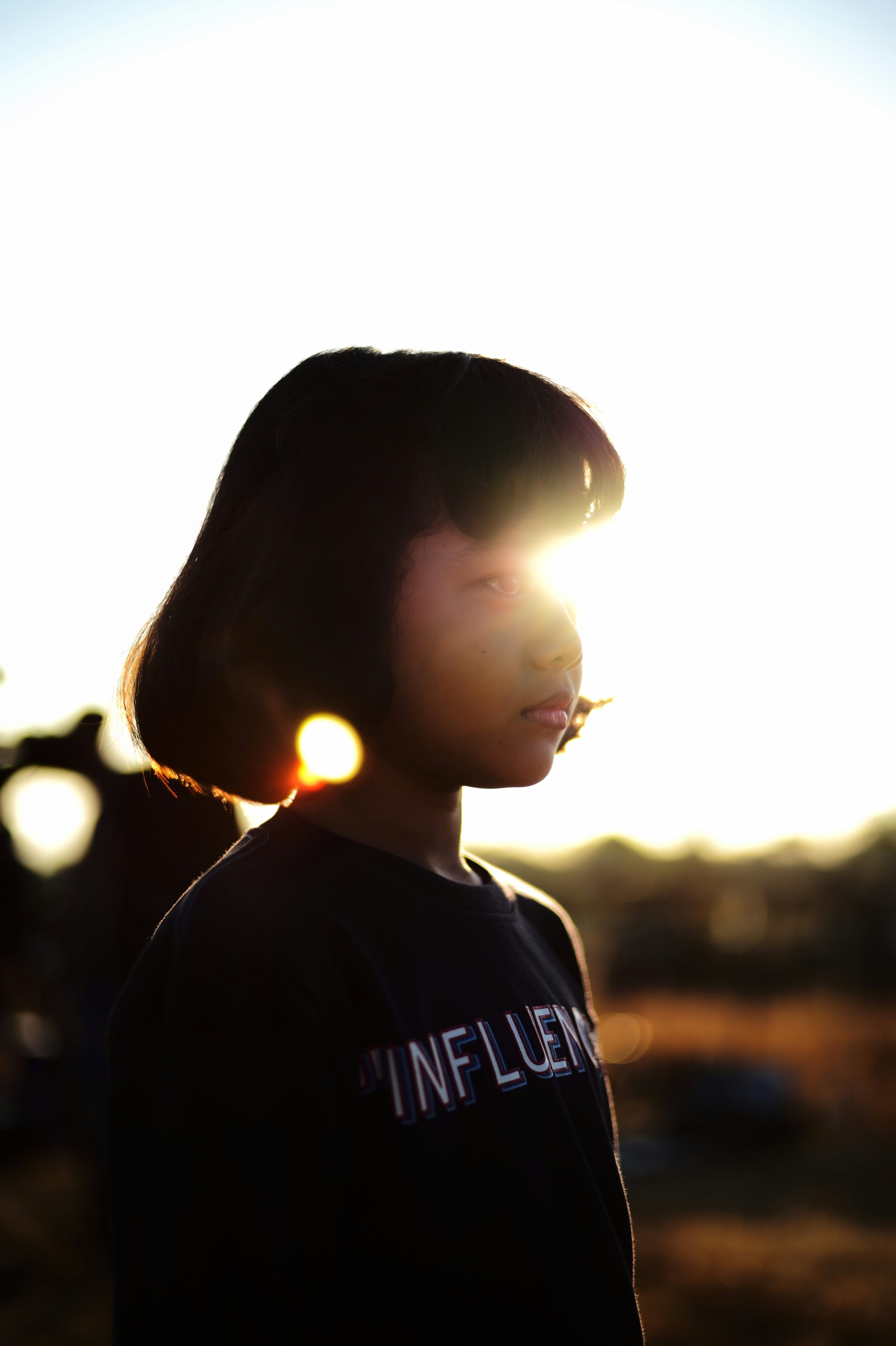 A boy with a bright light behind him photo – Free Photo Image on Unsplash