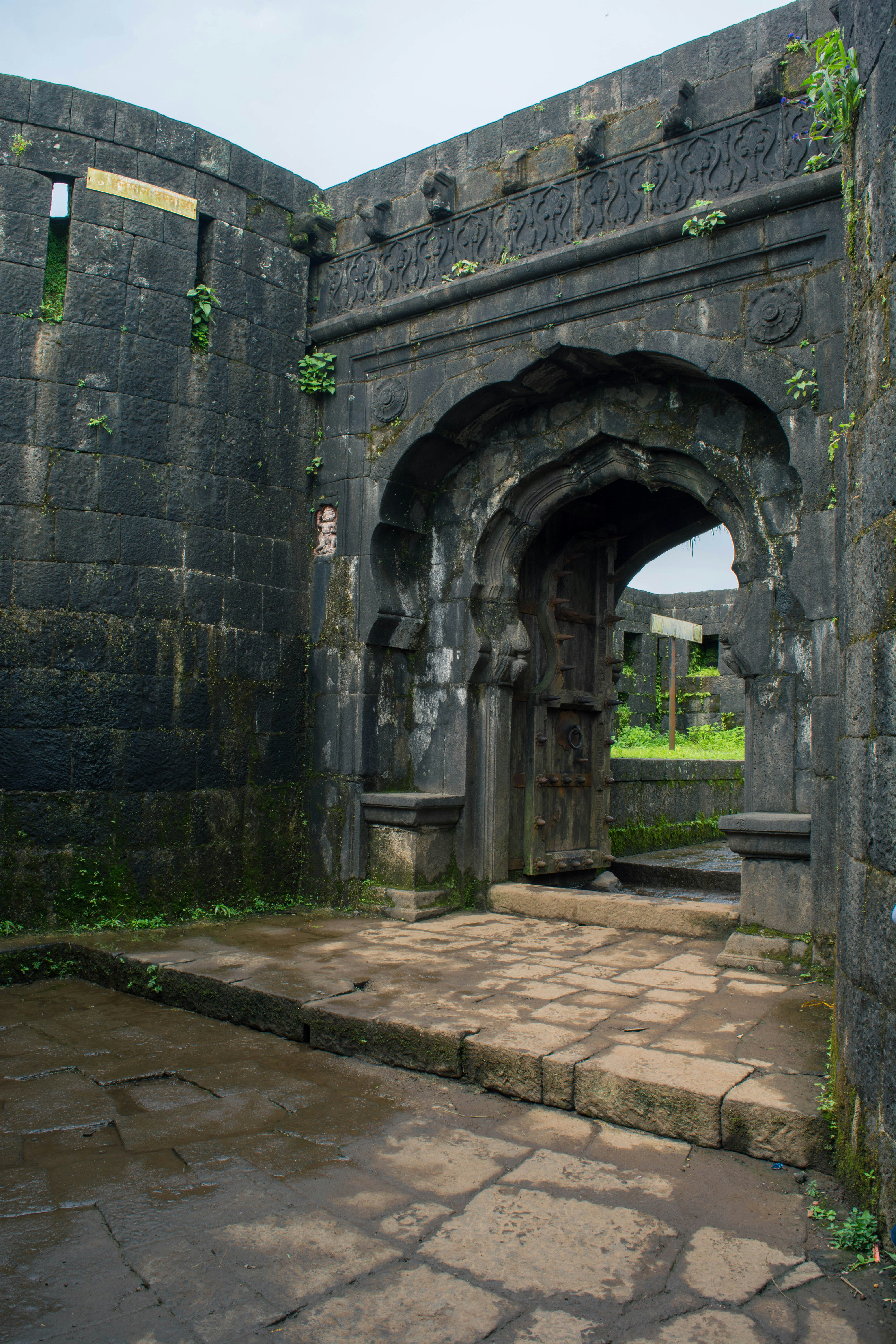 Lohagad is part of the Western Ghats. The hill extends to the northwest to a fortified spur, called Vinchukada (Scorpion's tail) because of its resembling shape. The four large gates of Lohagad are still in good condition and reasonably intact.