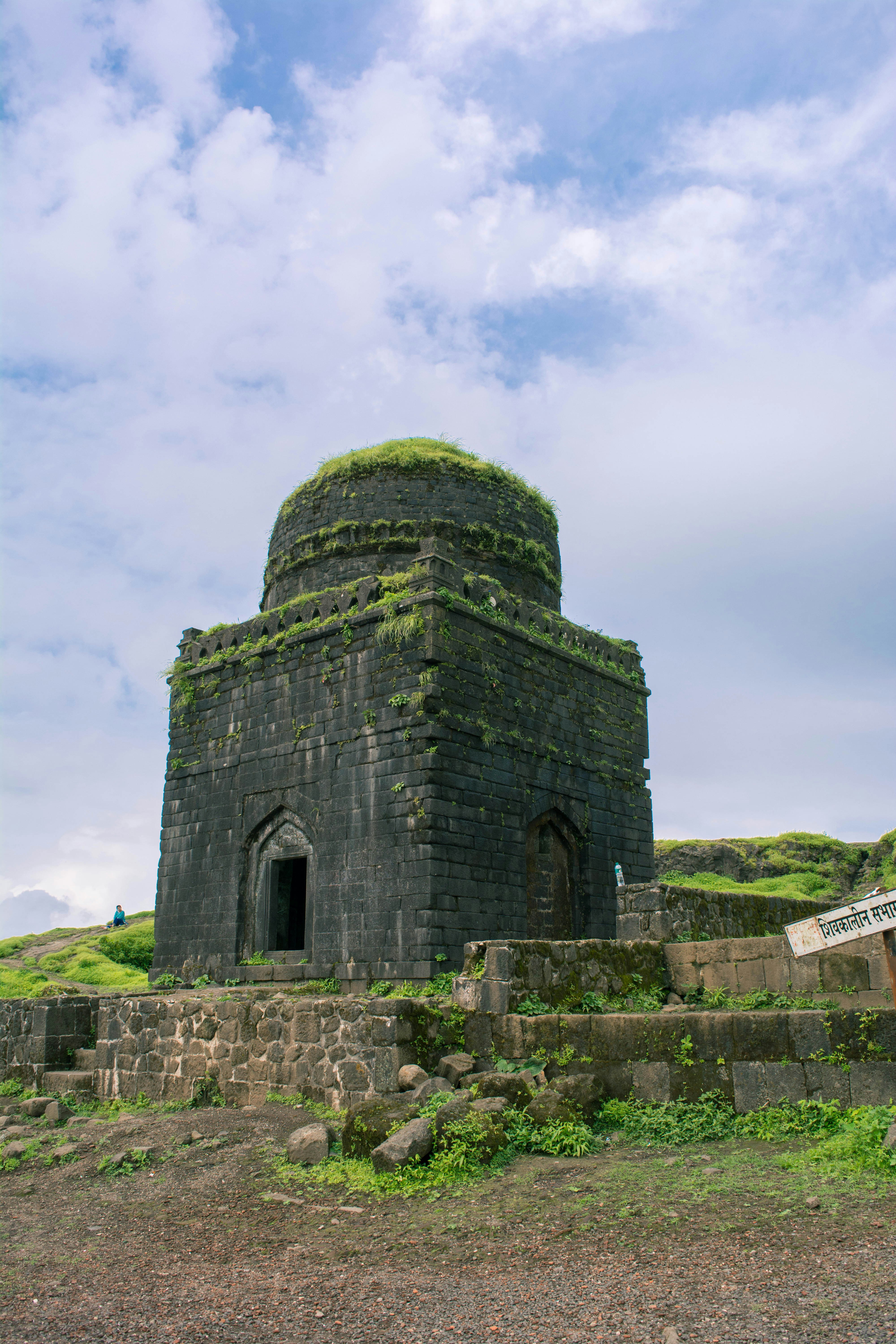 Moss-Cloaked Circular Bastion on a Hilltop