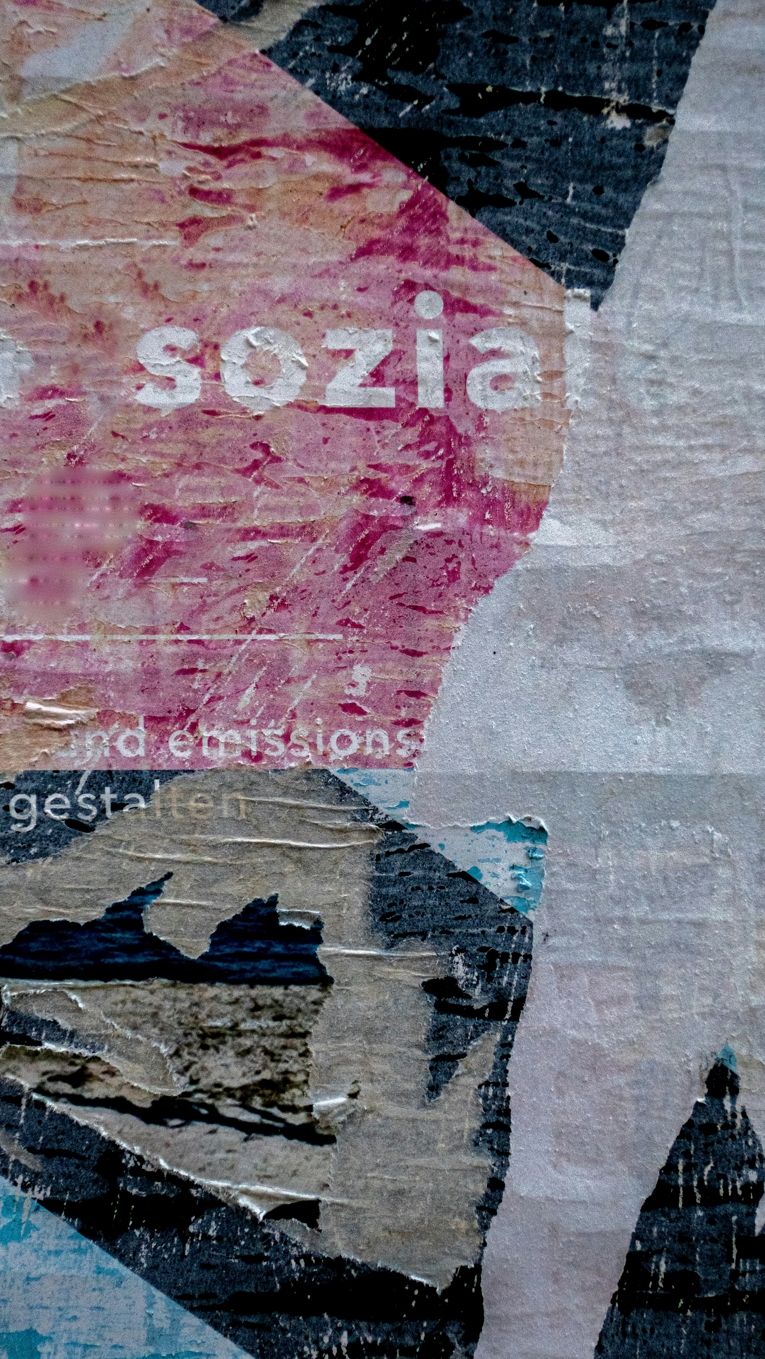Abstract collage featuring layered textures and faded text, illustrating the dynamic interplay of urban art and decay.