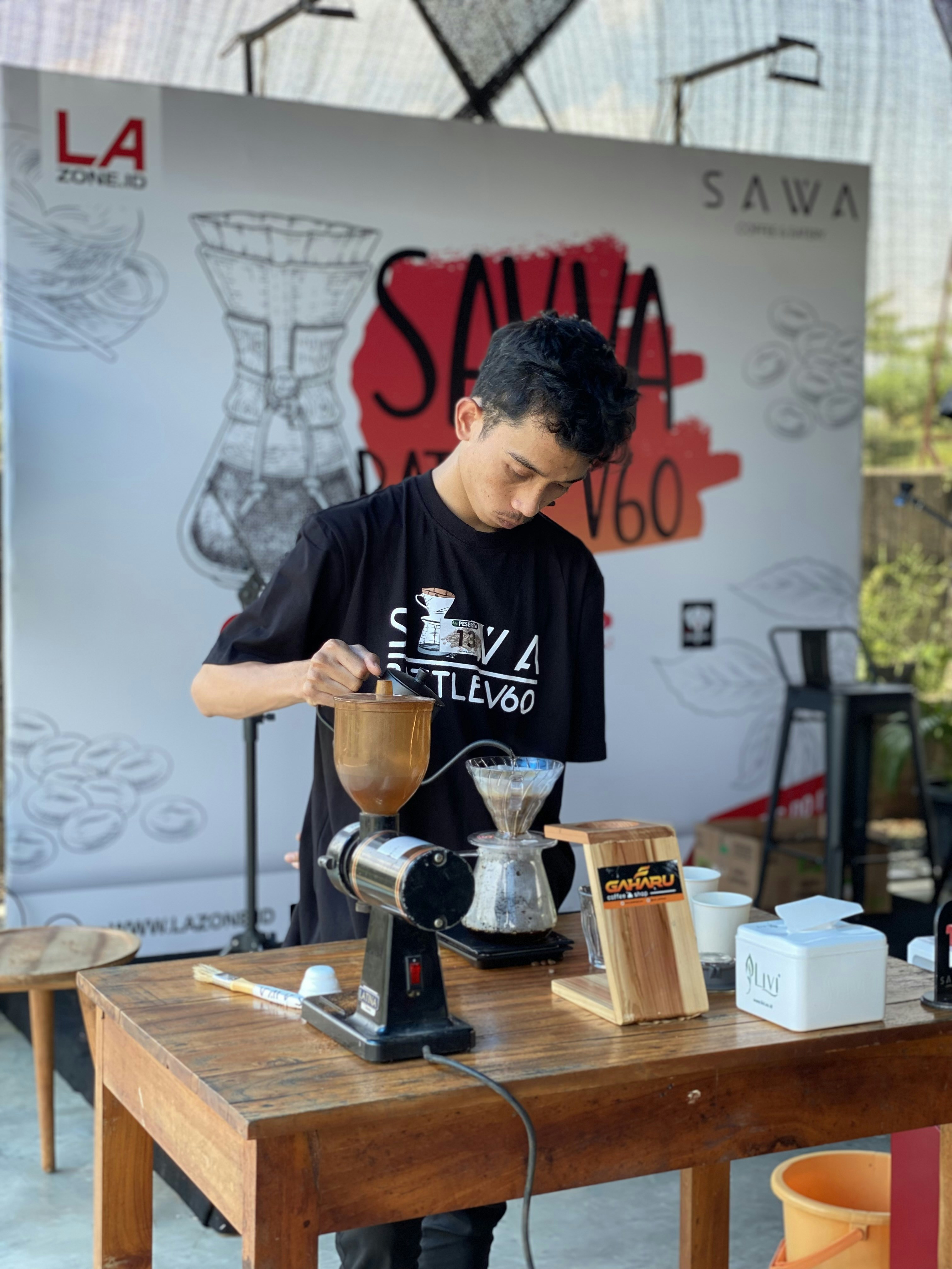 Precision Pour-Over: A Barista Refines Espresso at a Wooden Stand under SAWA