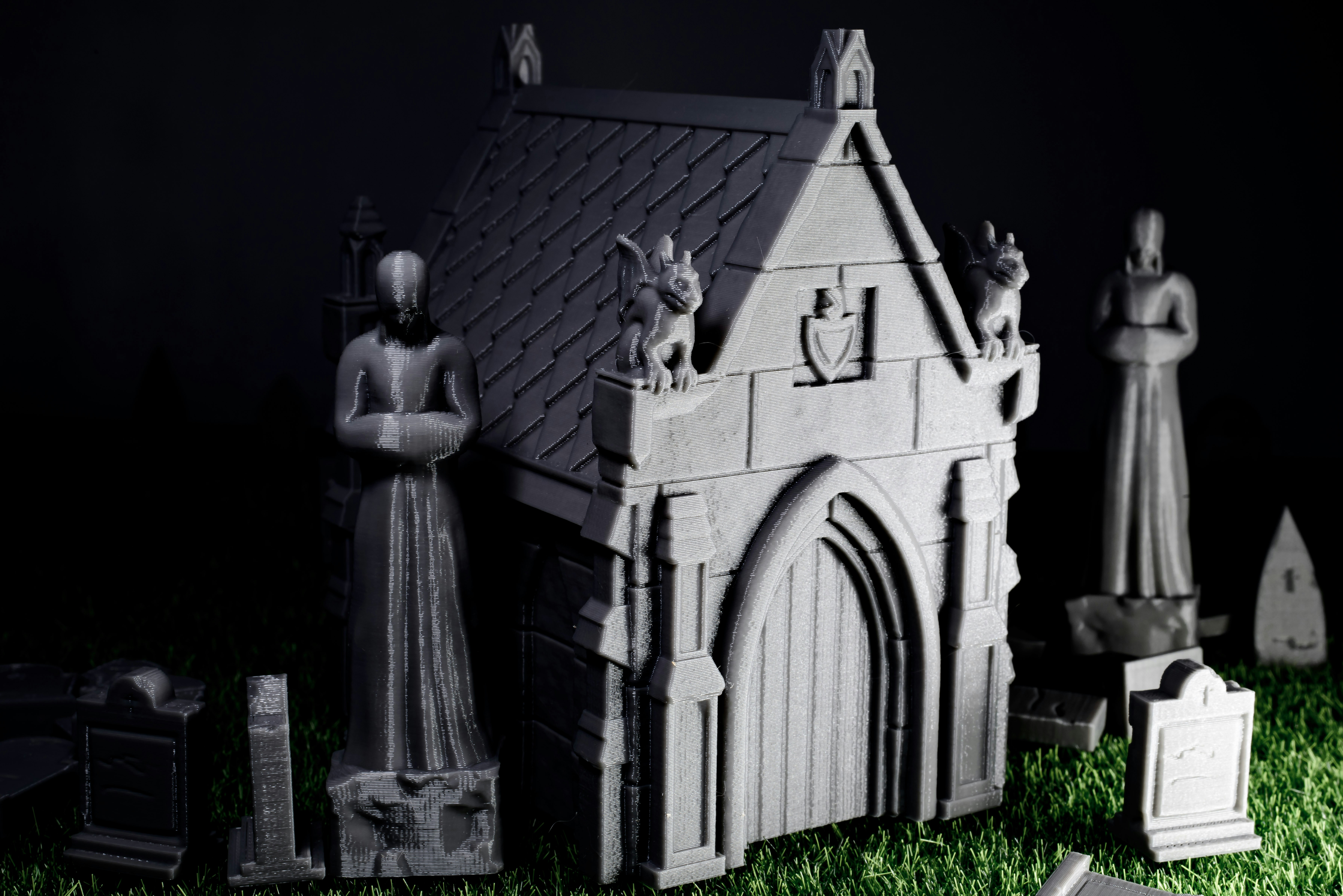 Moonlit Miniature Necropolis: Sculpted Shadows Among Graveyard Statues
