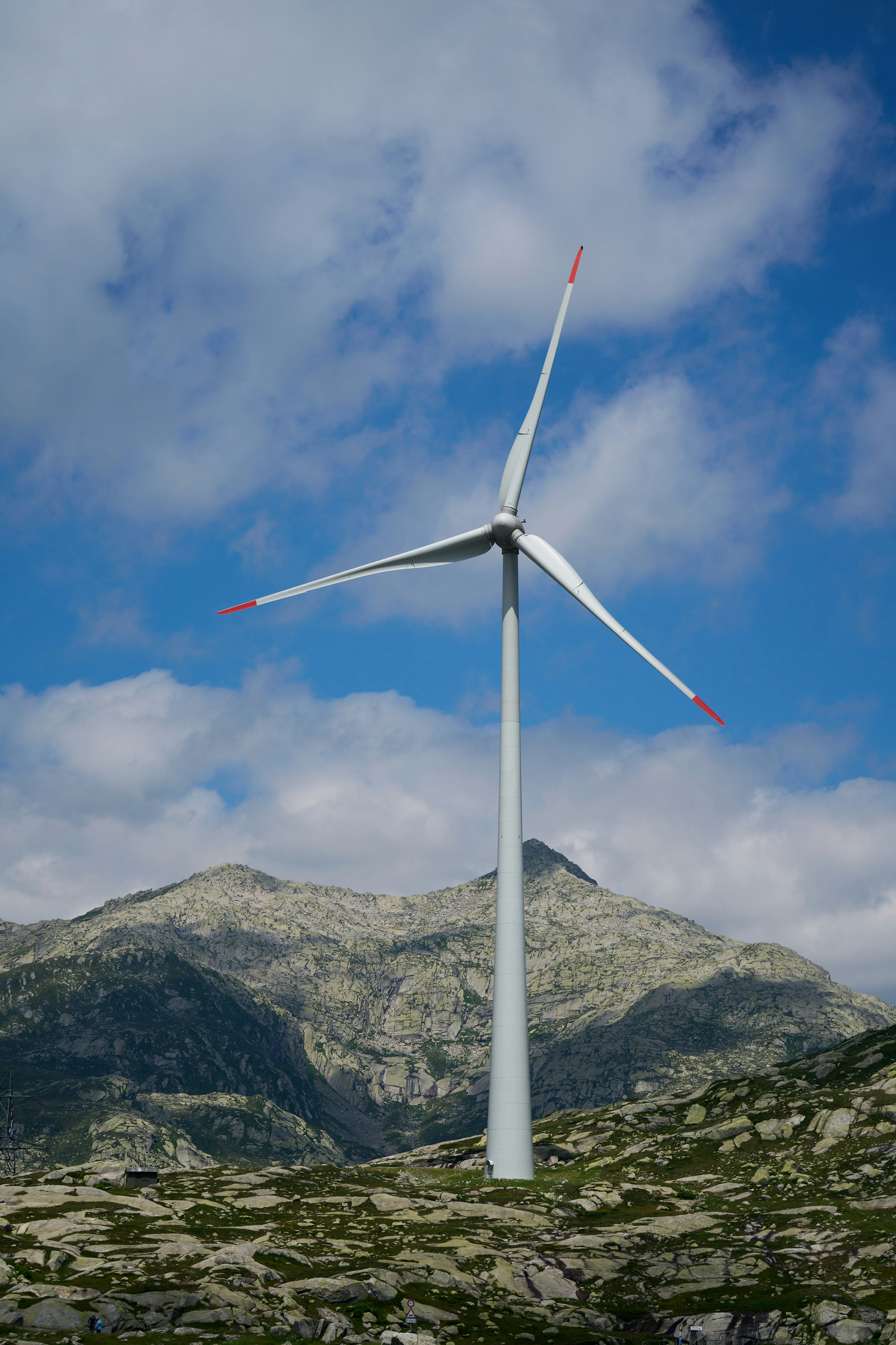A windmill on a mountain photo – Free Blue Image on Unsplash