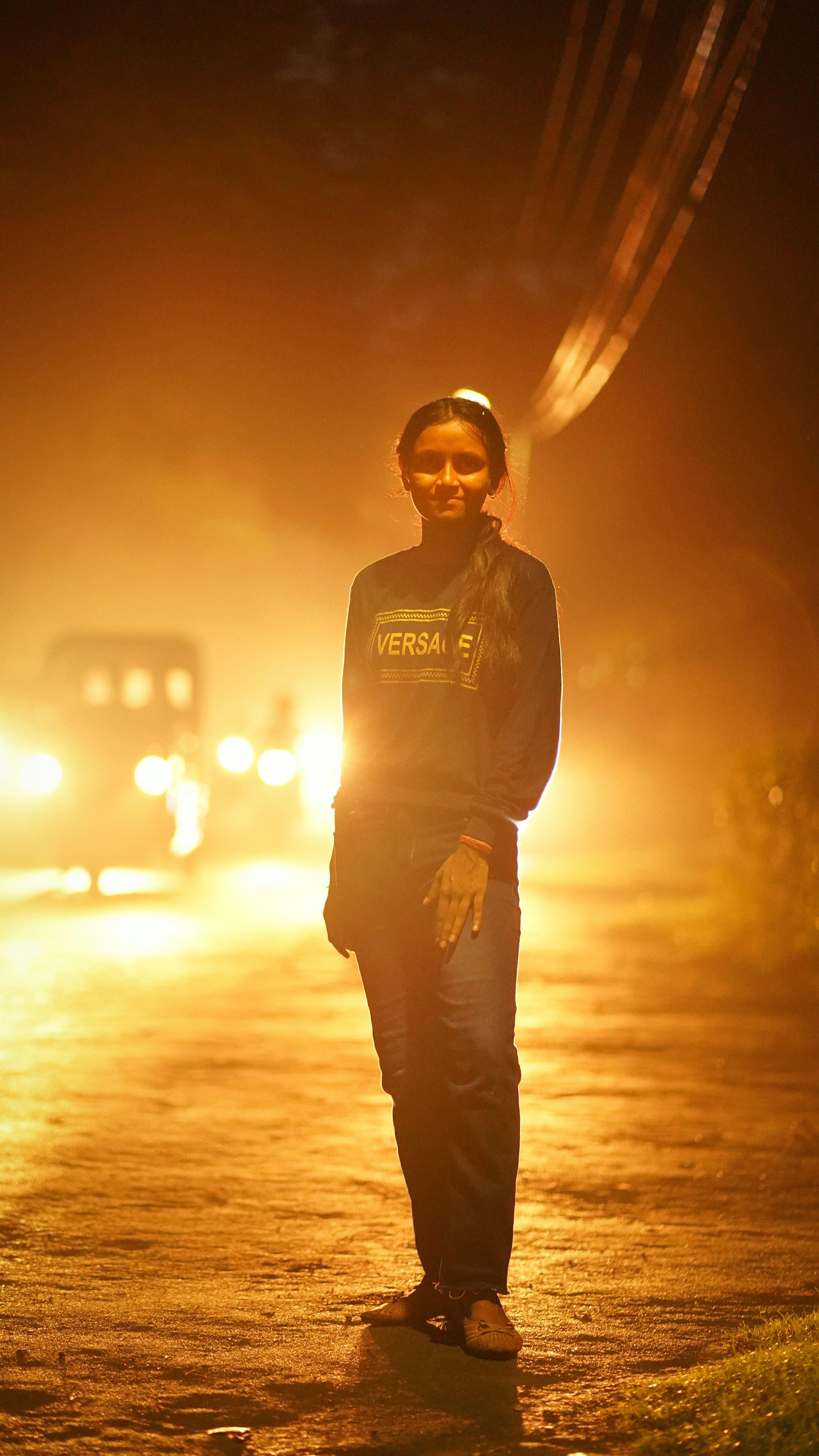 Halo of Night: A Quiet Portrait Amid Streetlight Mists