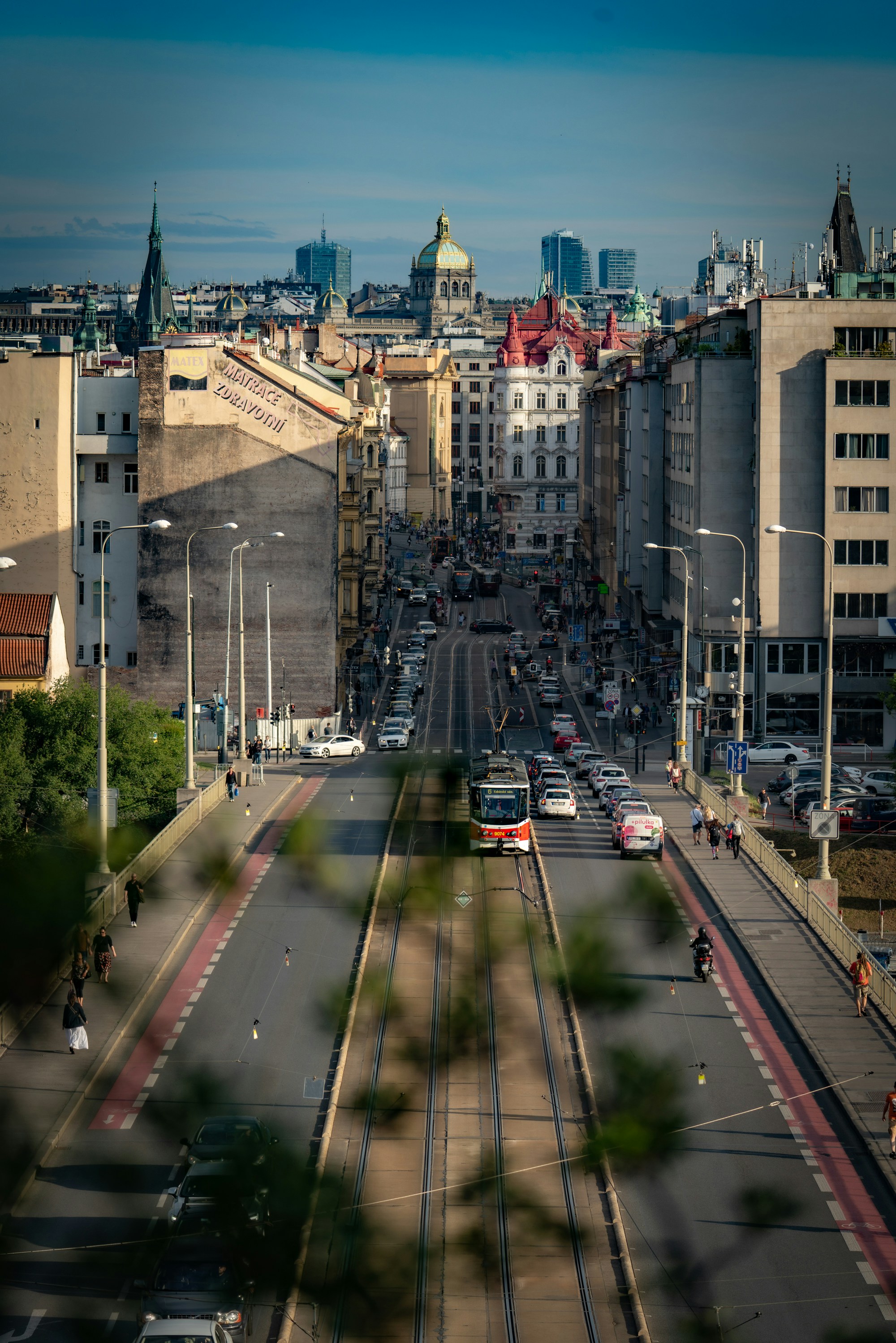 Tracks Toward the Dome: A City Street Carved by Light and Rails