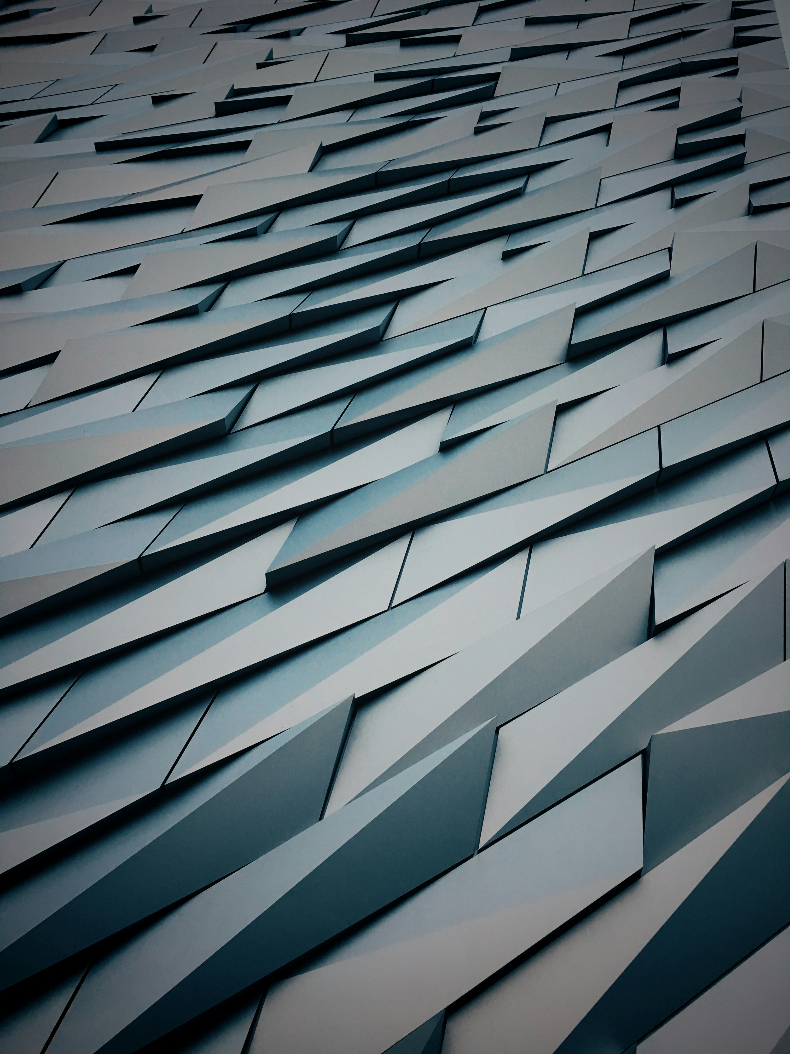 A close-up of several blueprints photo – Free Grey Image on Unsplash