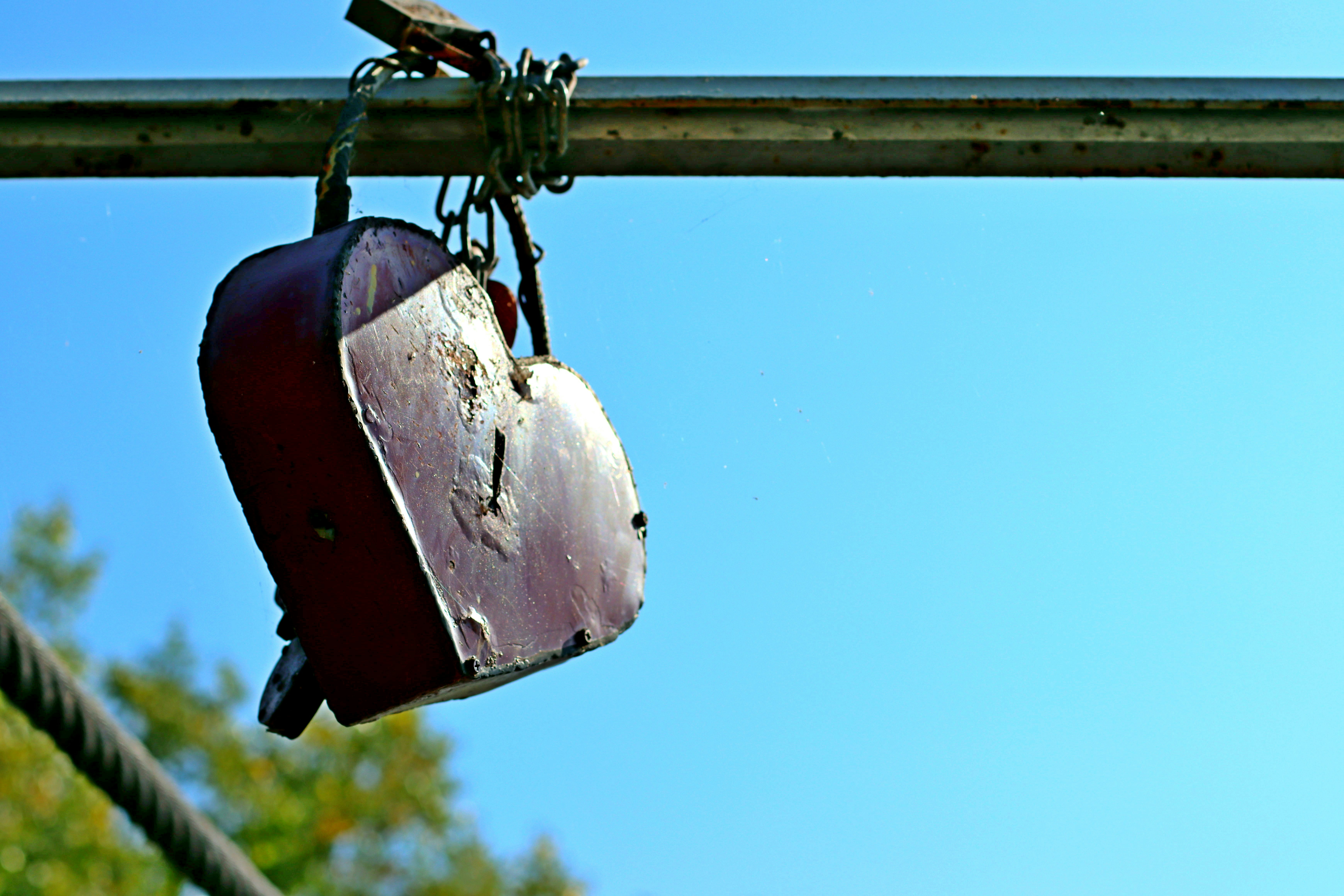 A red and white lantern from a metal pole photo – Free Lock Image on ...