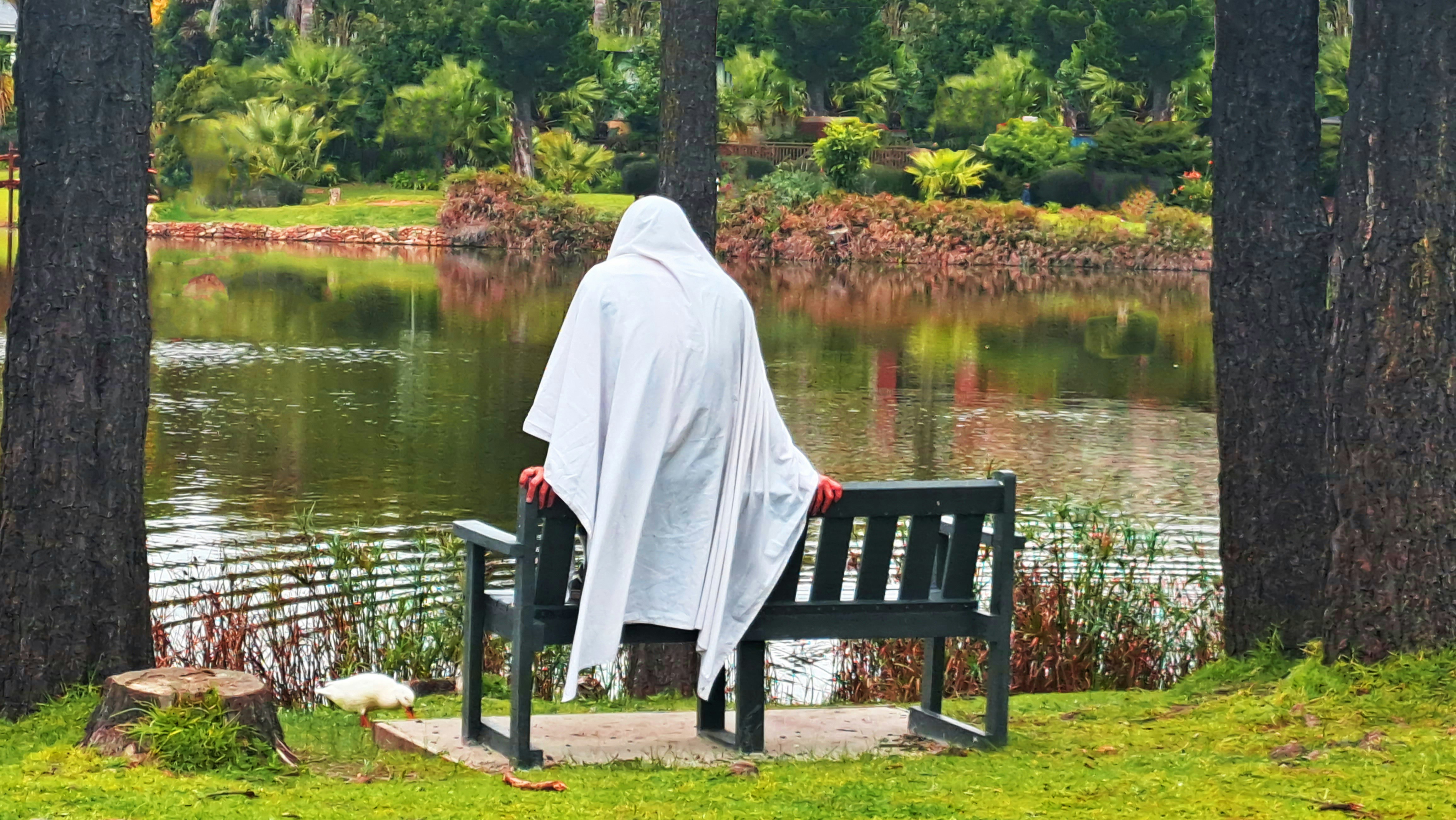 a person sitting on a bench