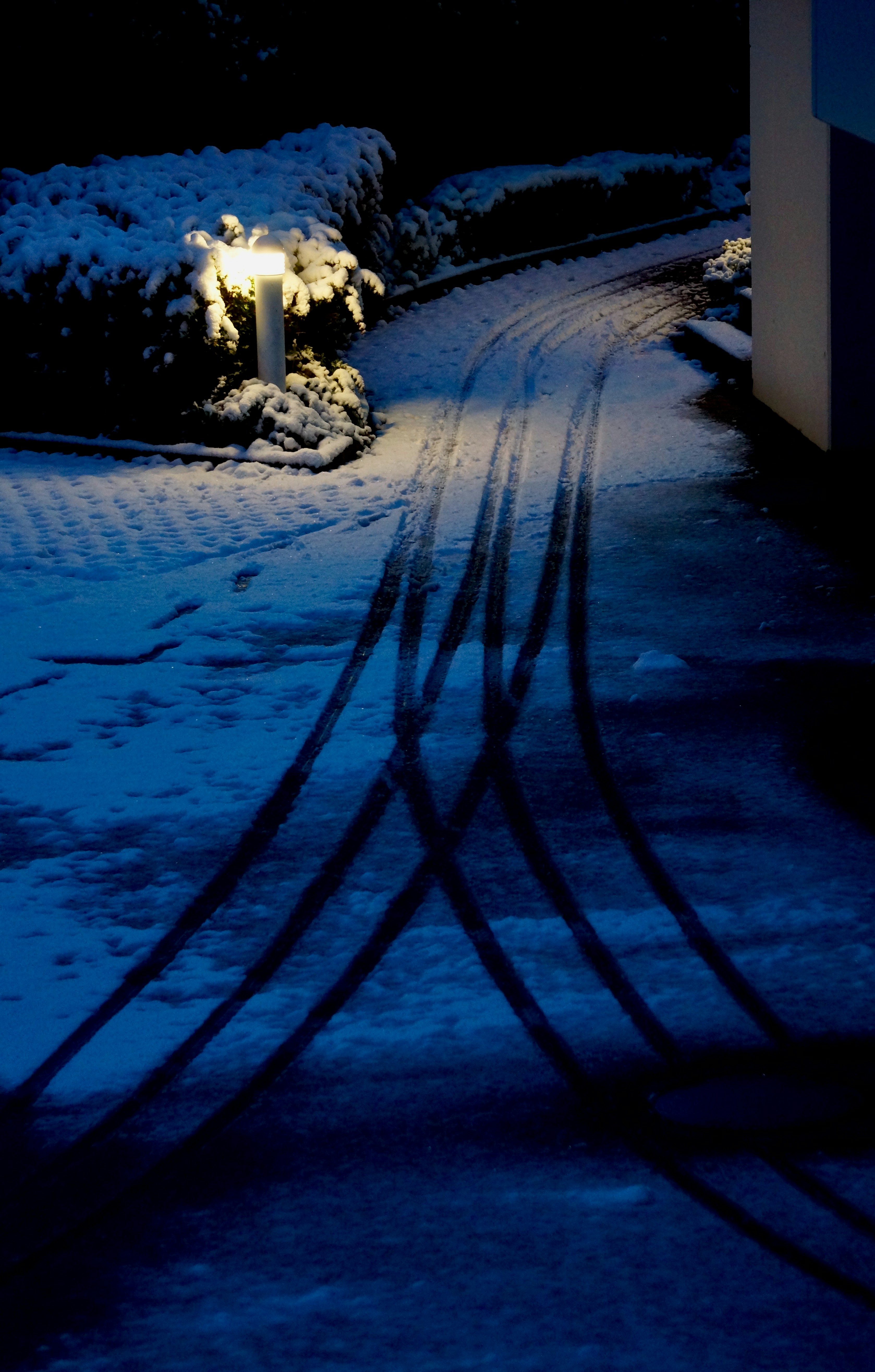 Whispers of Winter: Tire Tracks in the Snow