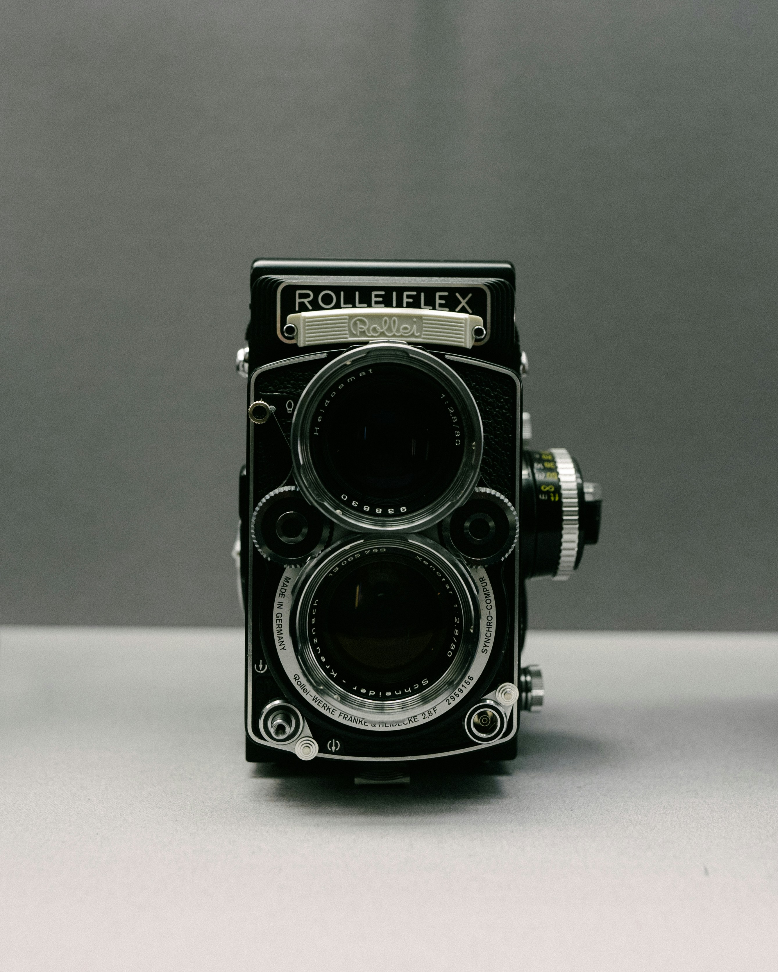 a black camera with a lens