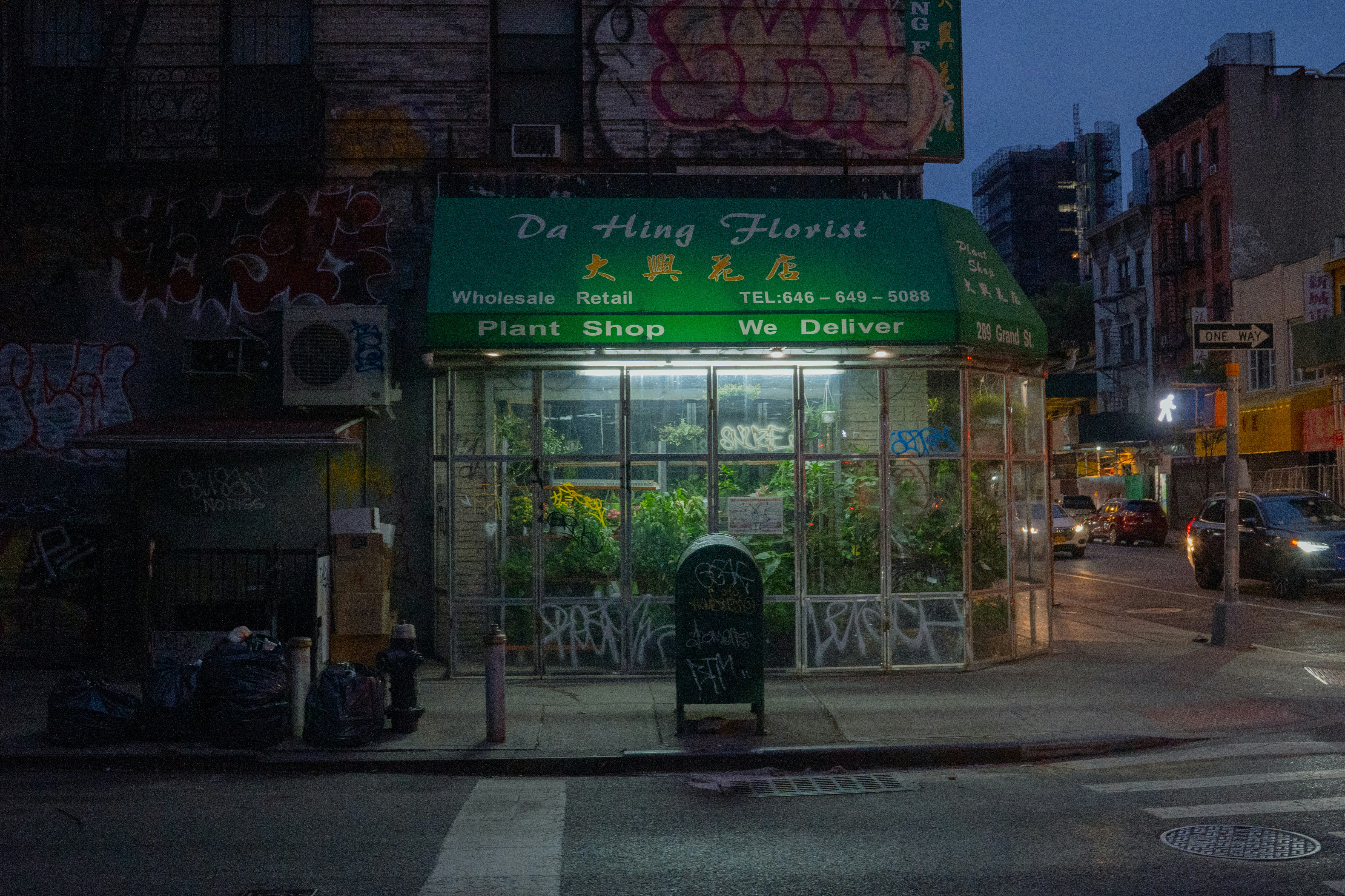 A storefront on a street corner photo – Free Grey Image on Unsplash