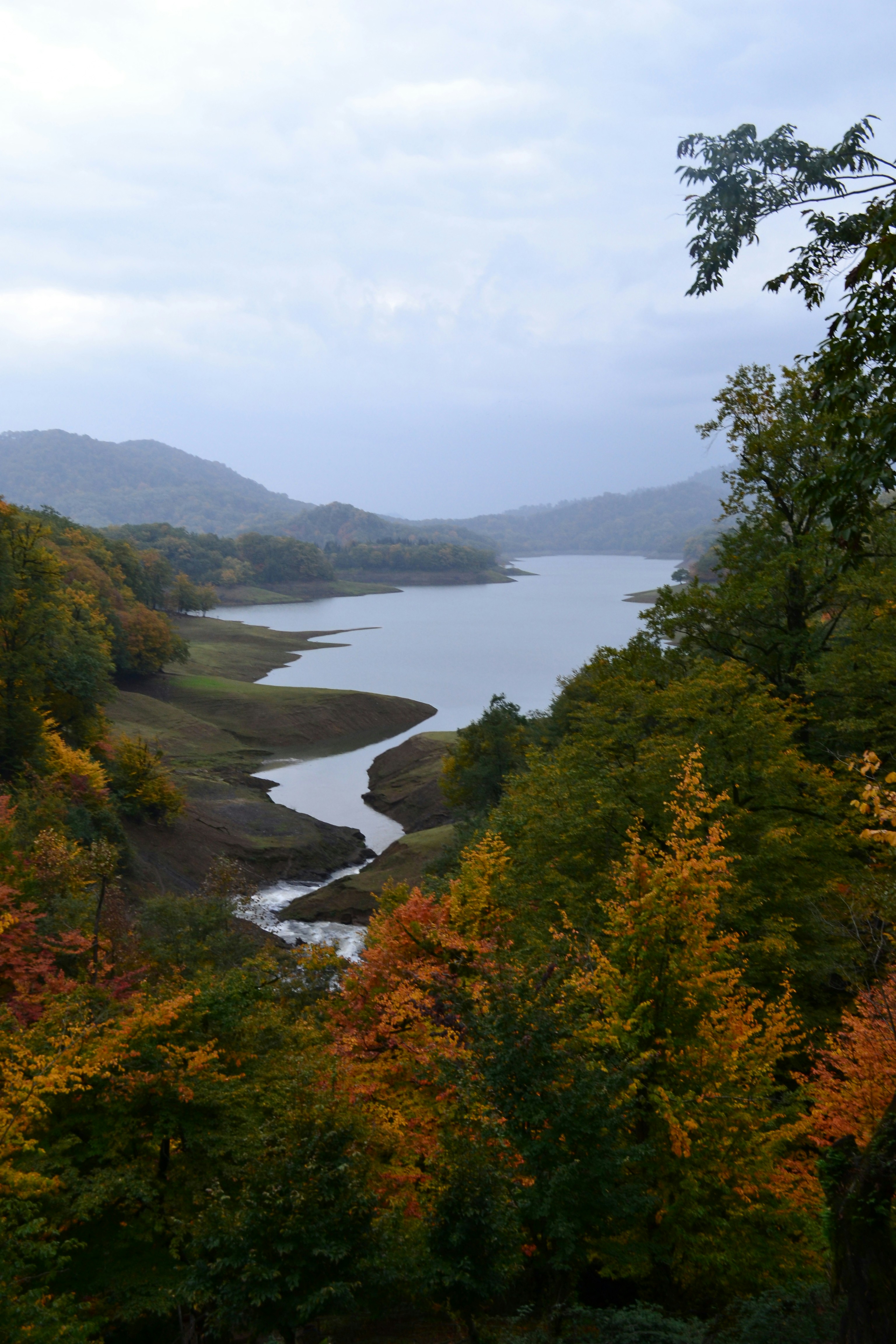 A river with a bridge going over it photo – Free Lenkaran Image on Unsplash