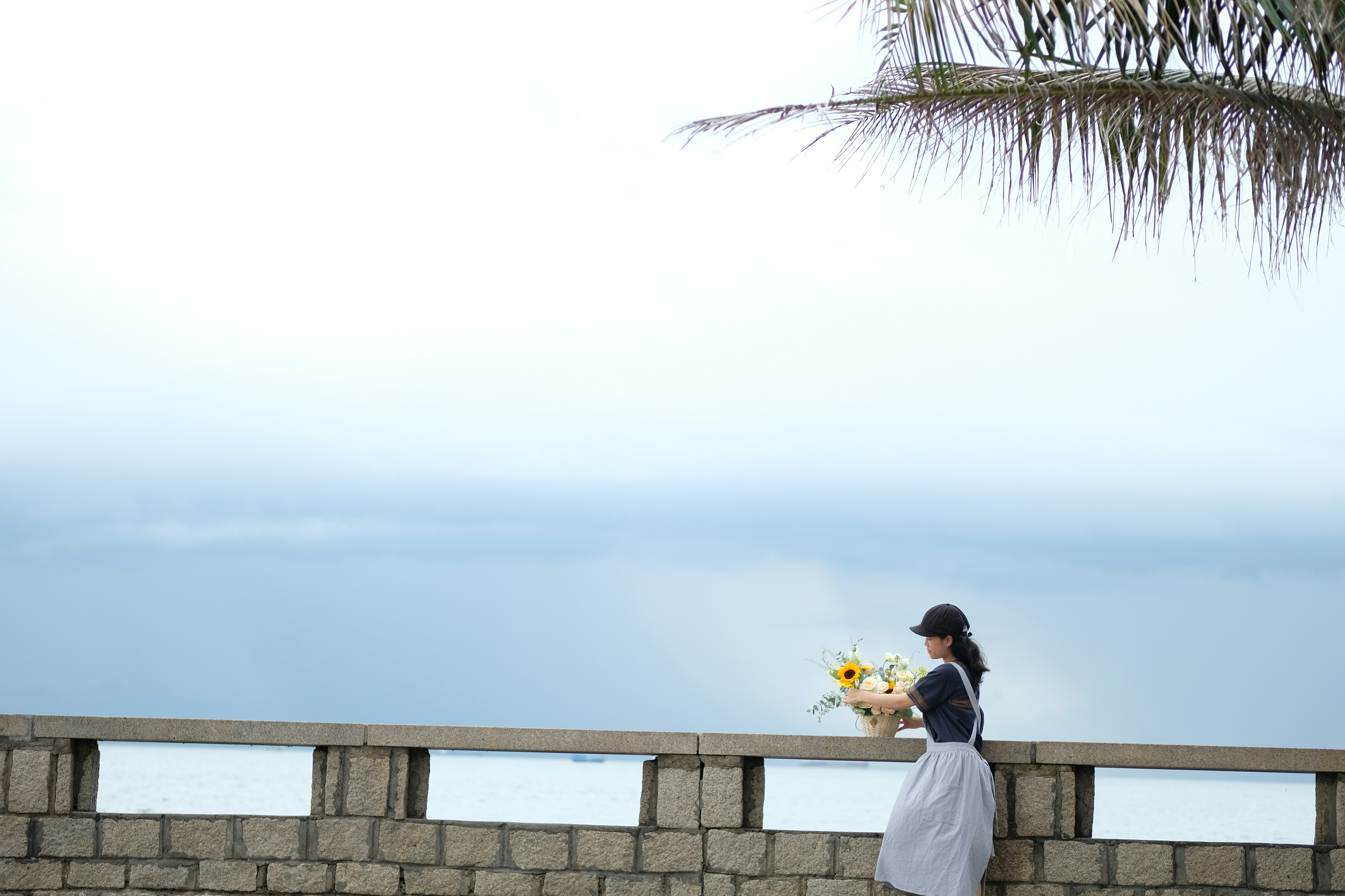 Sunflowers at the Seaside Balcony: Quiet Portrait by the Horizon