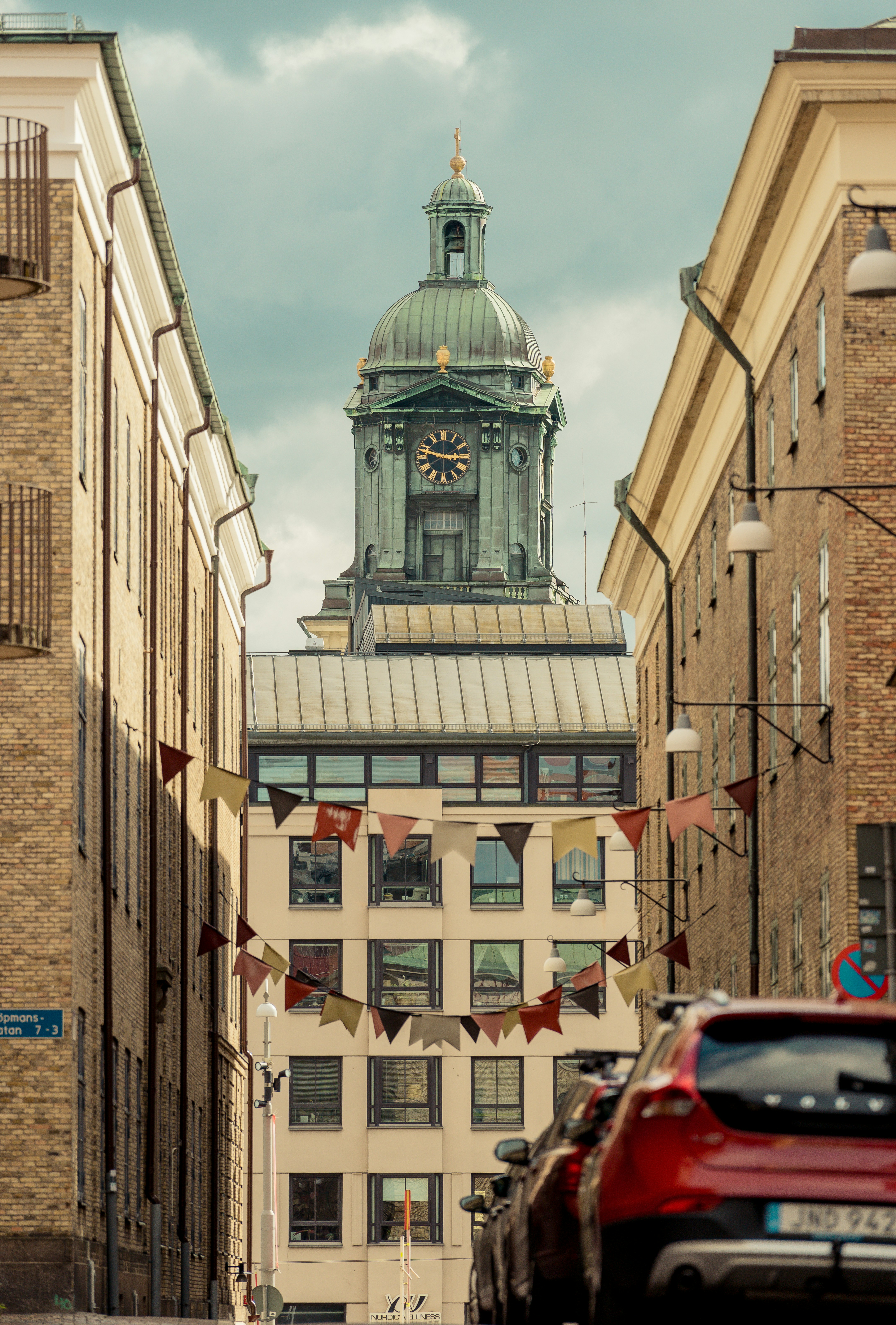 A clock tower on a building photo – Free Gothenburg Image on Unsplash