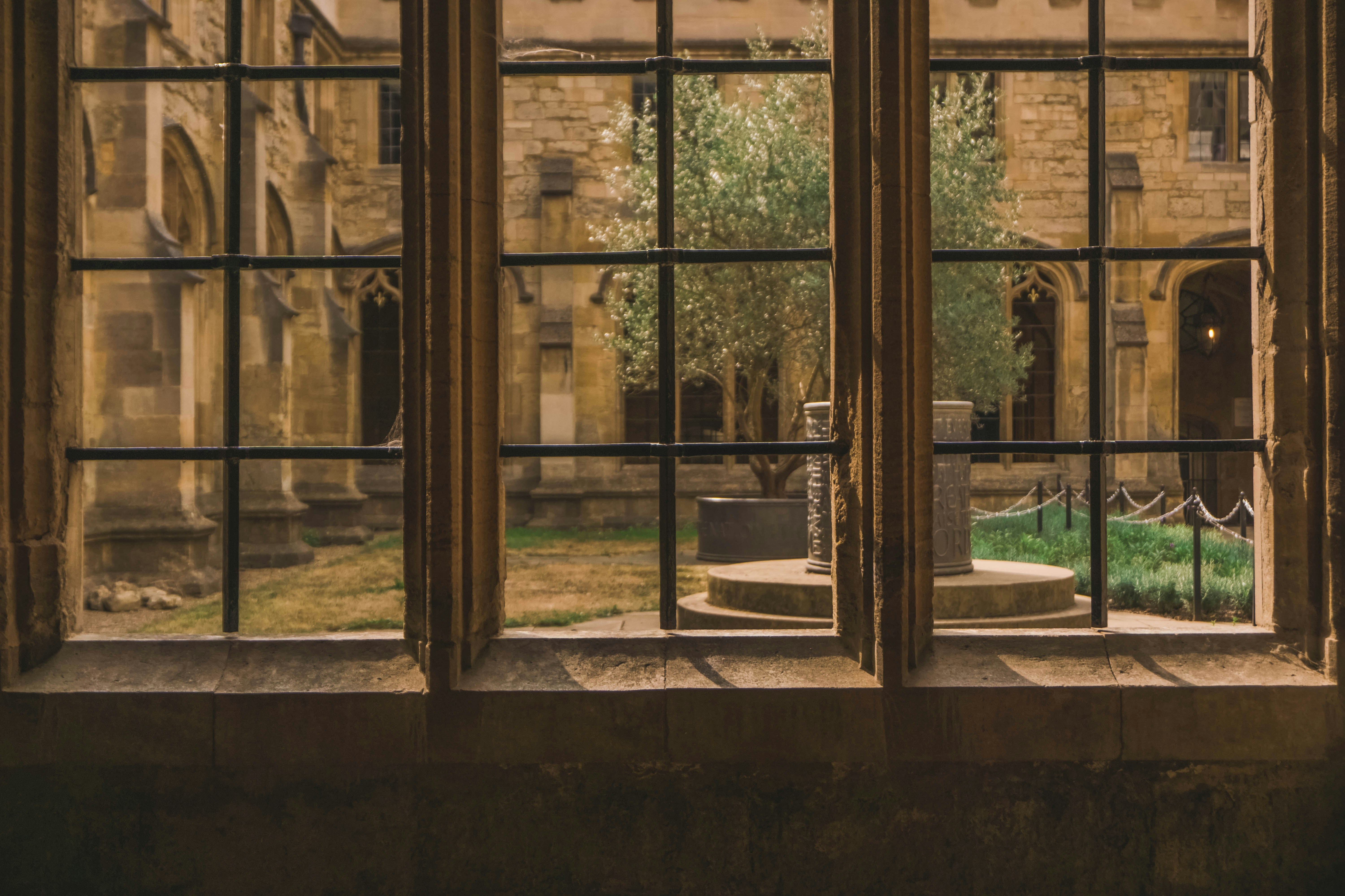 A view through a window of a building photo – Free Window Image on Unsplash