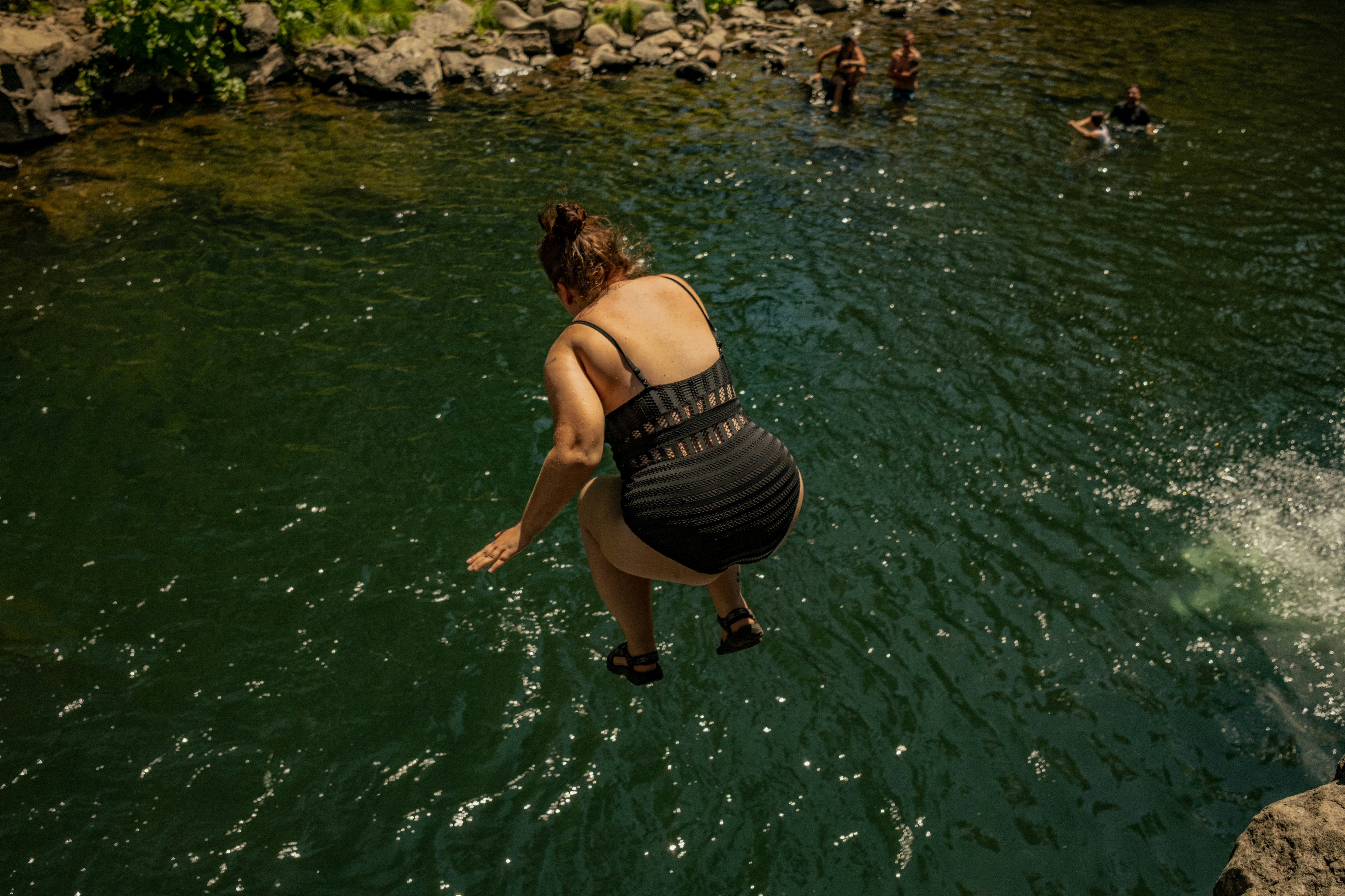 a person in a swimsuit in the water