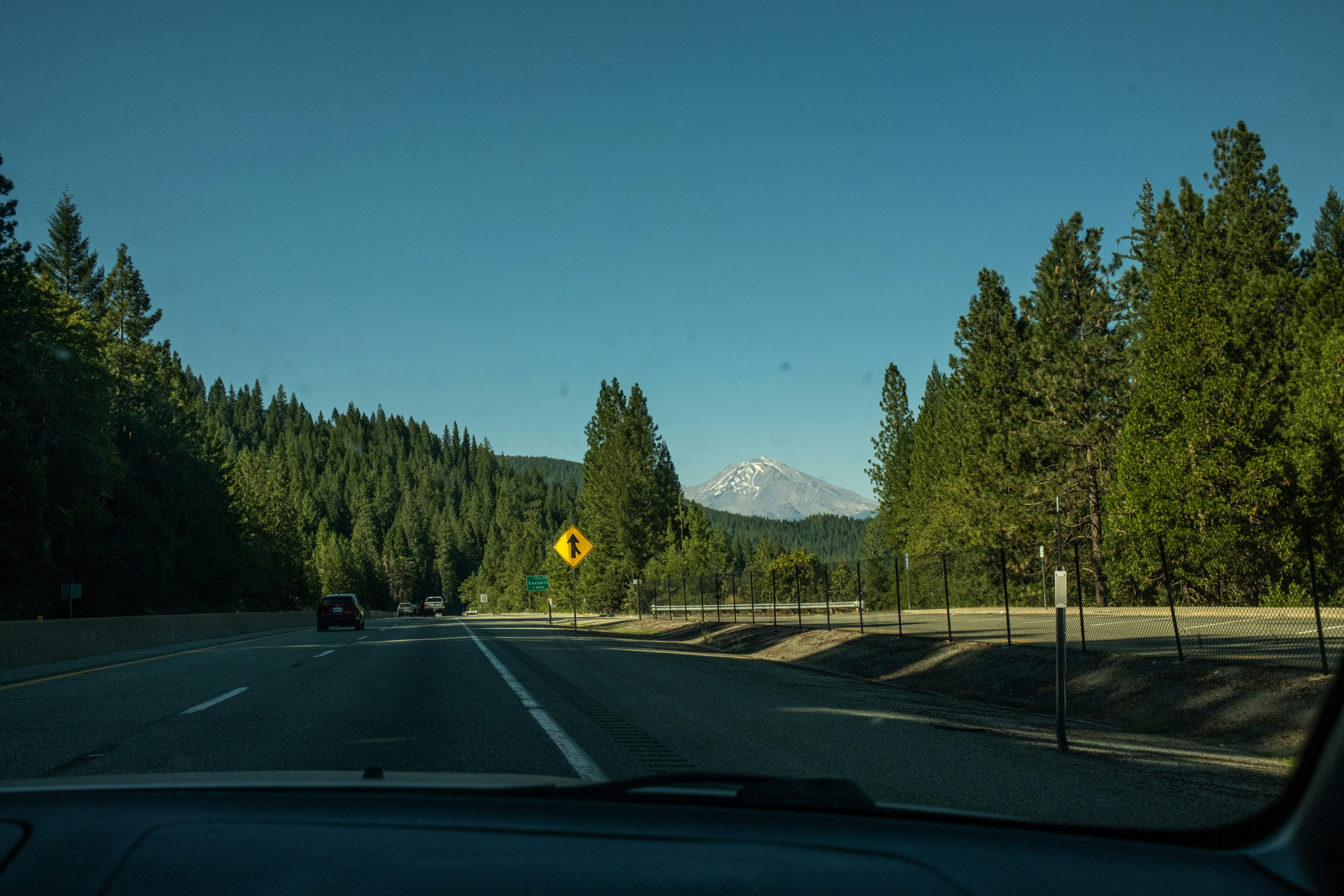 Highway Toward a Snow-Capped Summit
