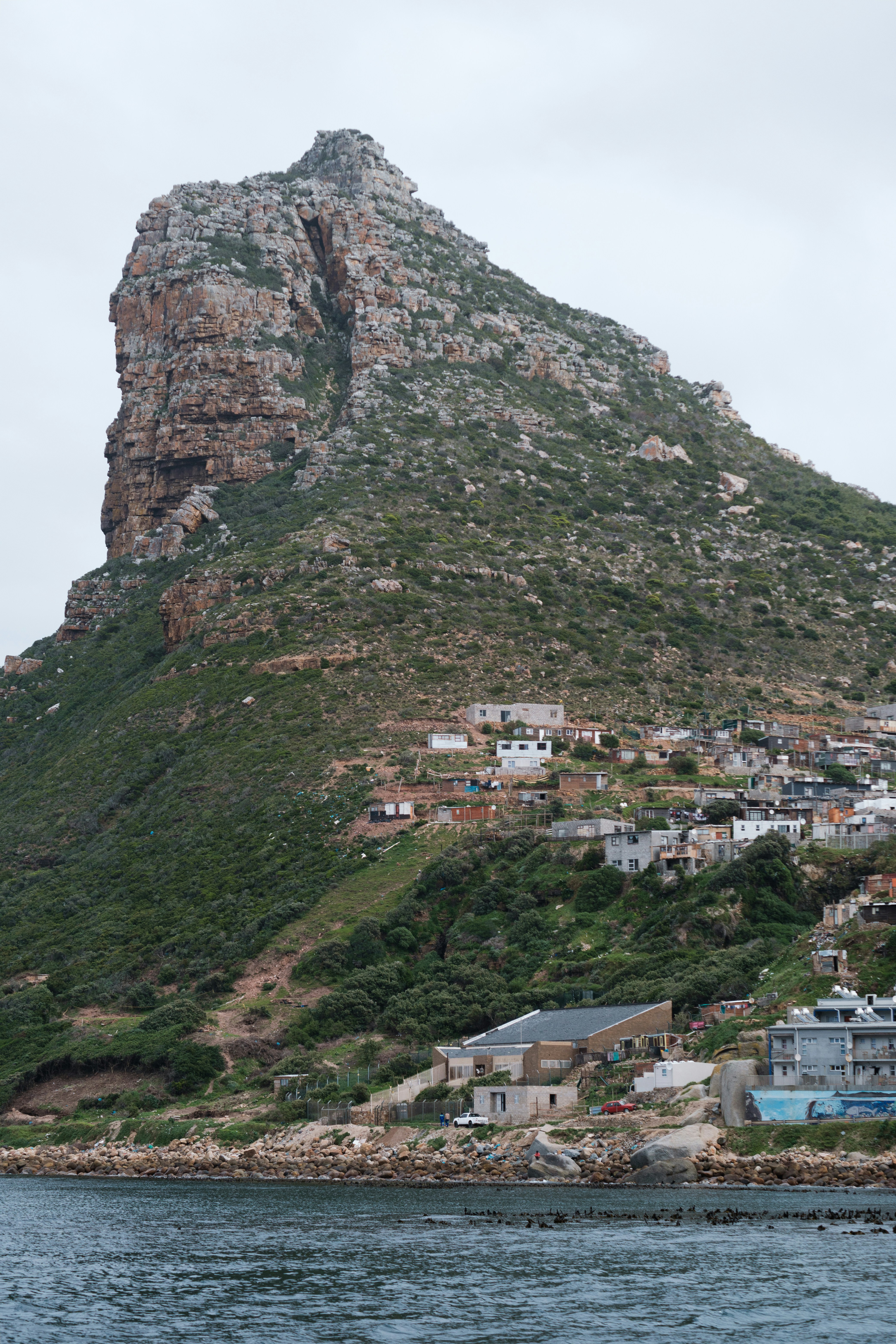 Stone Sentinel Over the Coastal Village