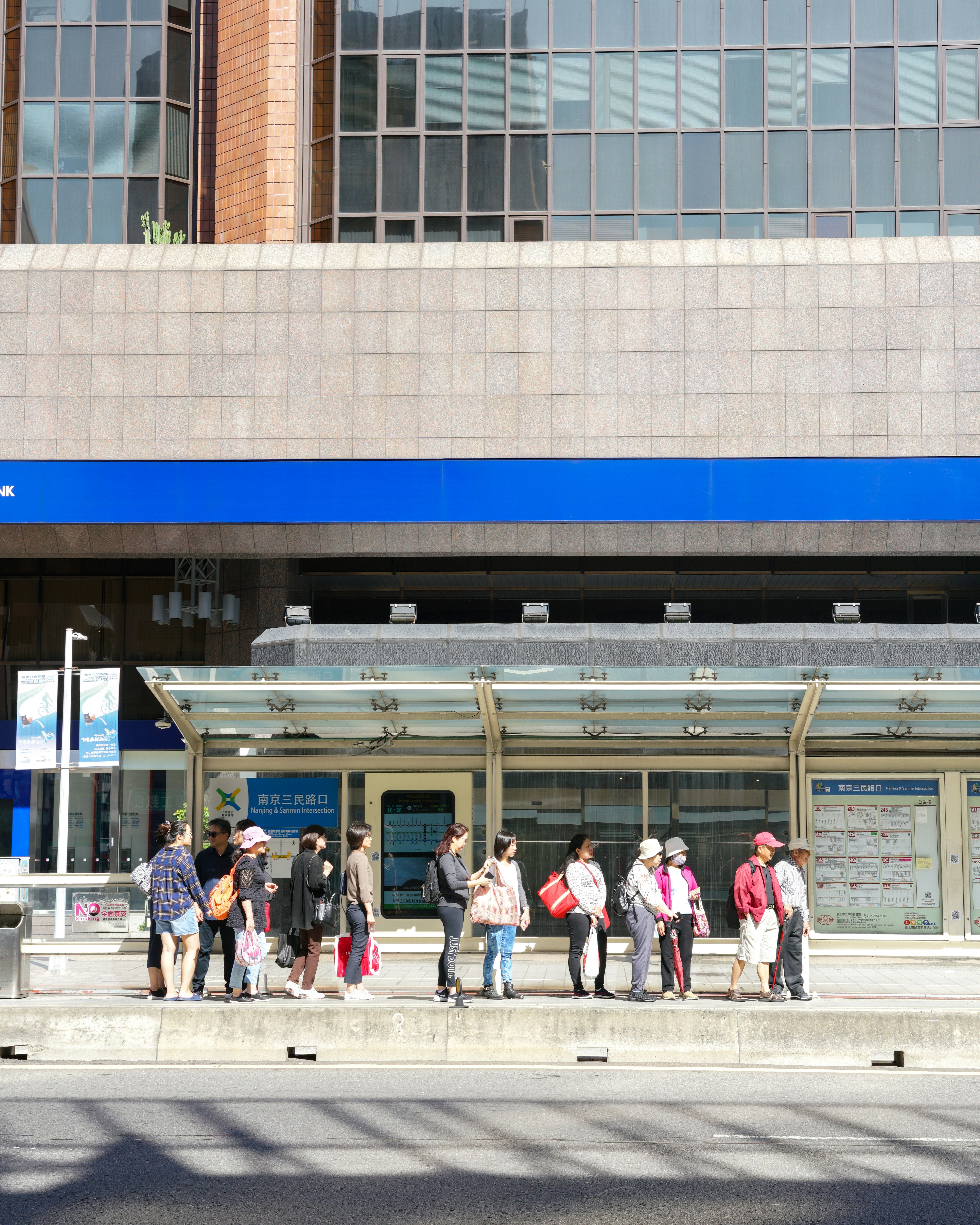 A group of people standing outside a building photo – Free Taiwan Image ...